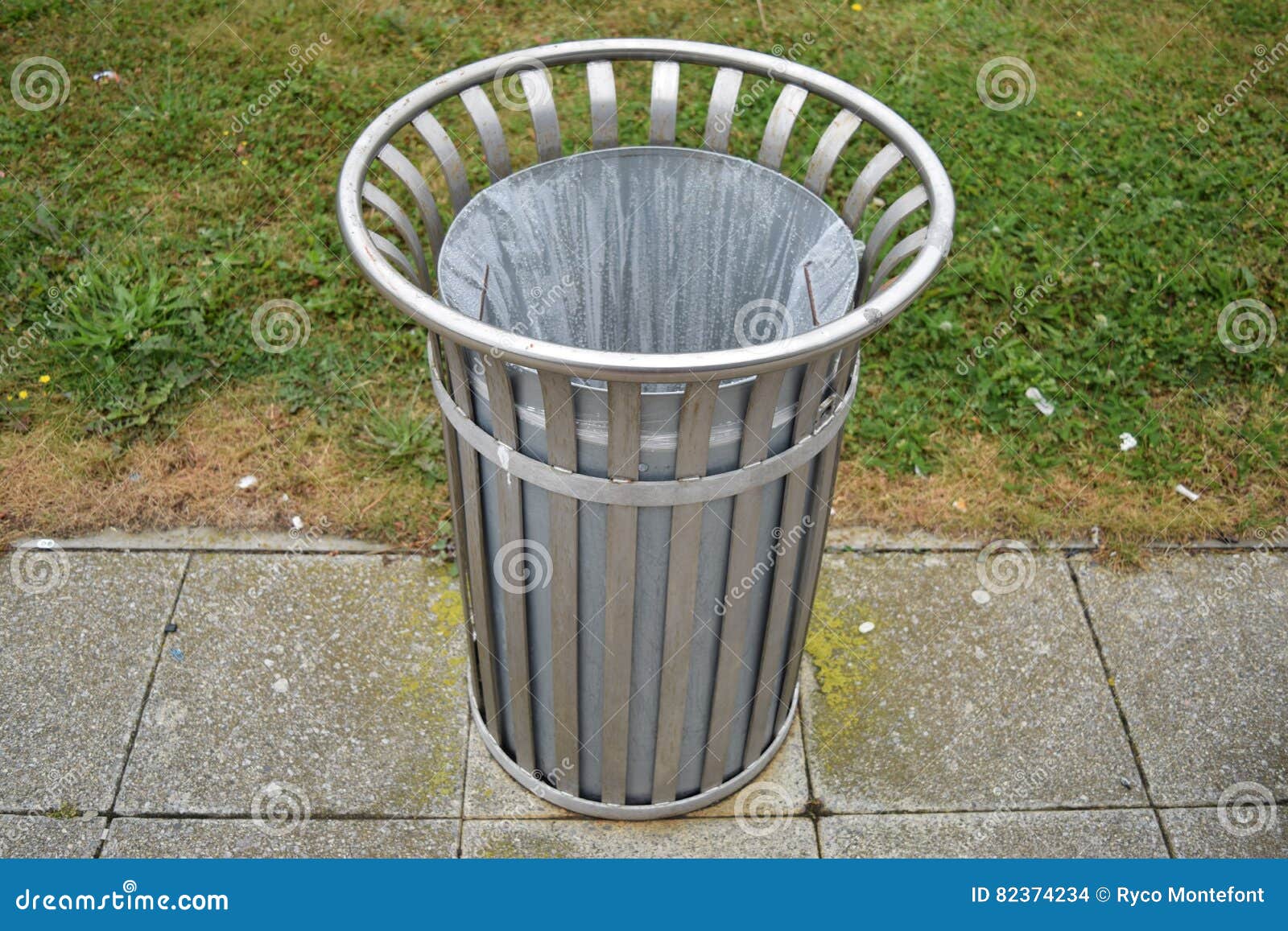 Modern Metallic Bin on the Pavement Stock Photo - Image of metallic ...