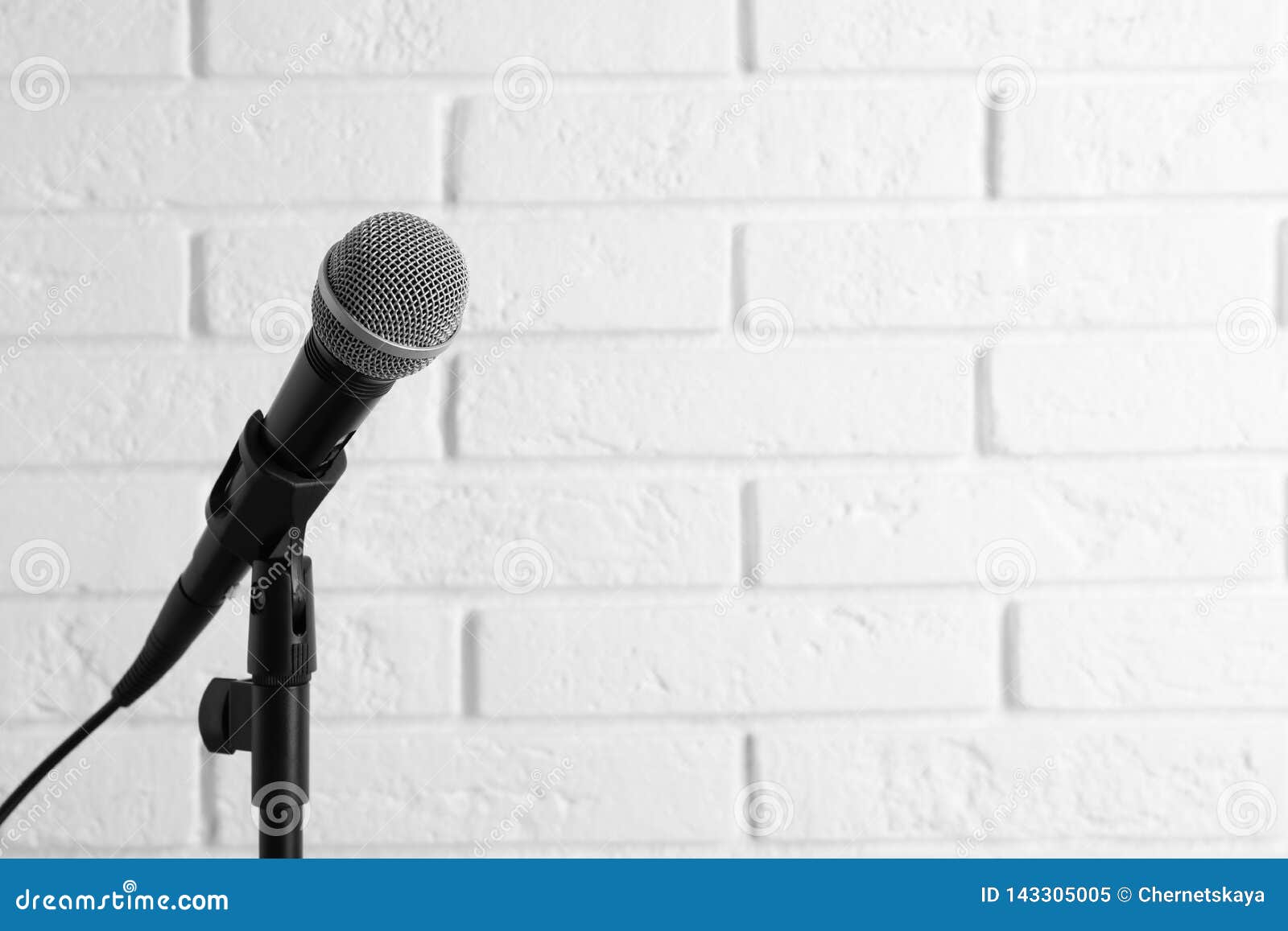 Modern Microphone Near Brick Wall Stock Image - Image of device, music ...