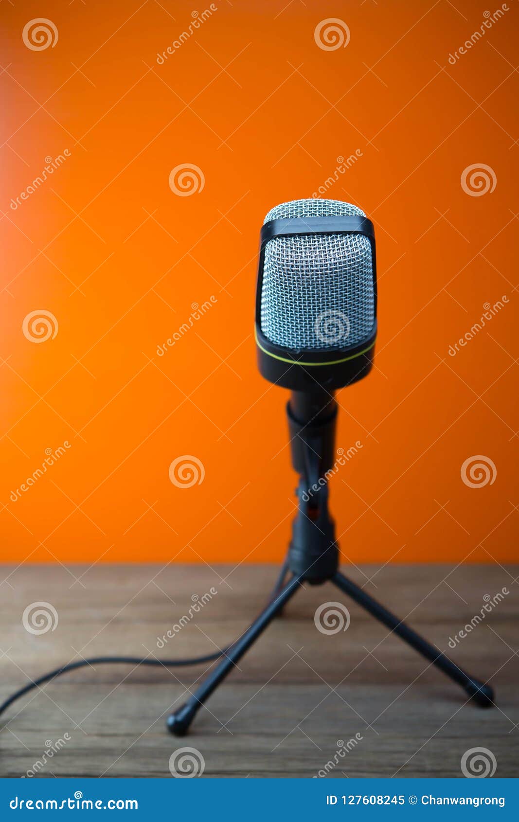 Modern Microphone with Orange Background and Wooden Floor, Soft Stock ...