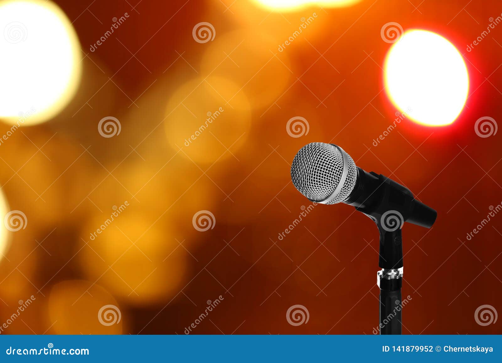Modern Microphone on Stand Against Blurred Background Stock Photo ...
