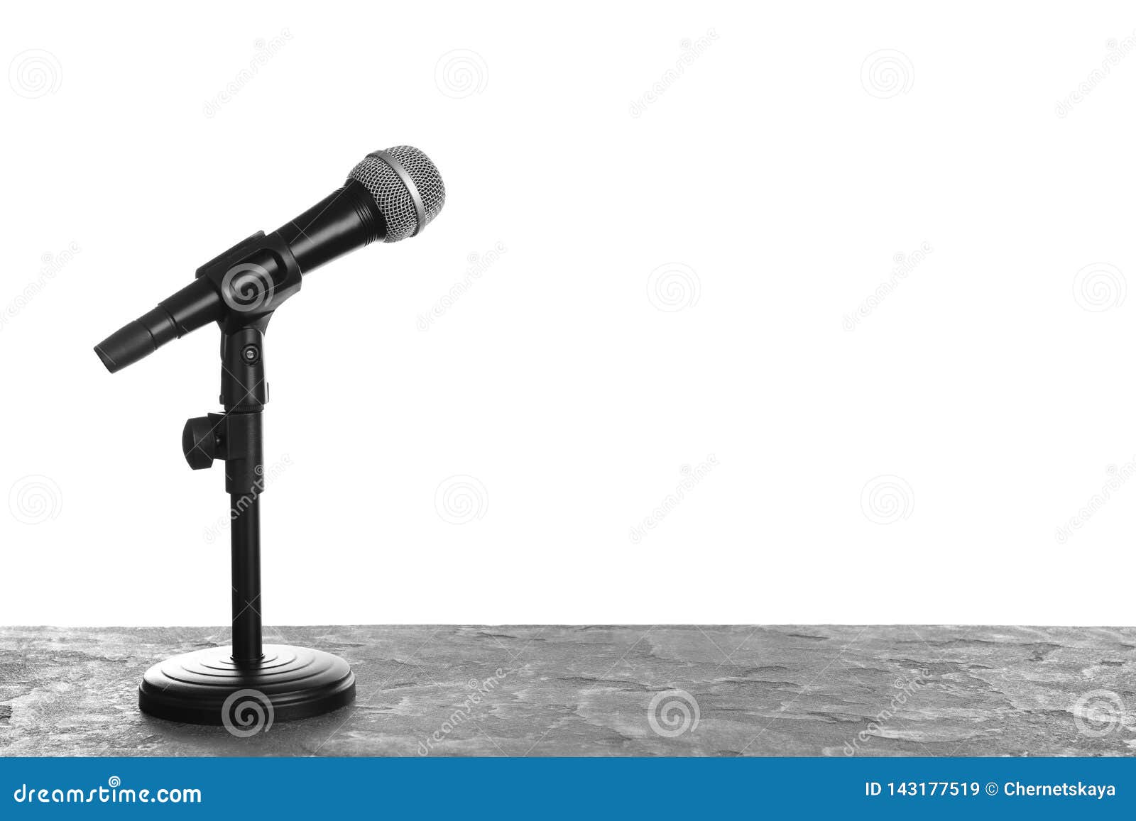 Modern Microphone On Table Against White Background Stock Image - Image ...