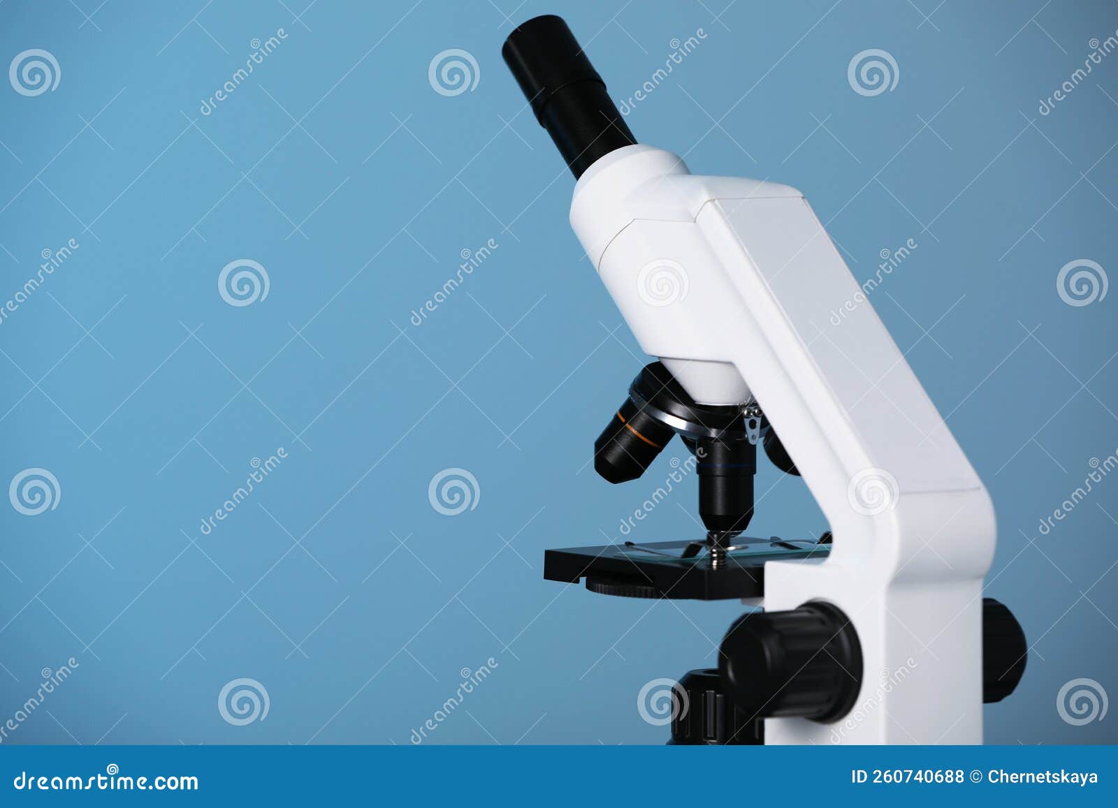 Modern Microscope on Blue Background. Space for Text Stock Photo ...