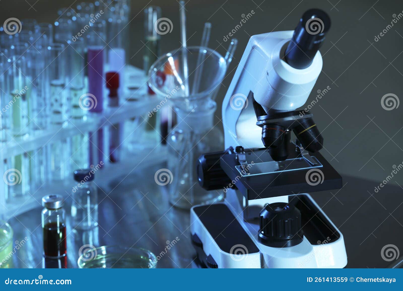 Modern Microscope with Glass Slide on Metal Table in Laboratory, Toned ...