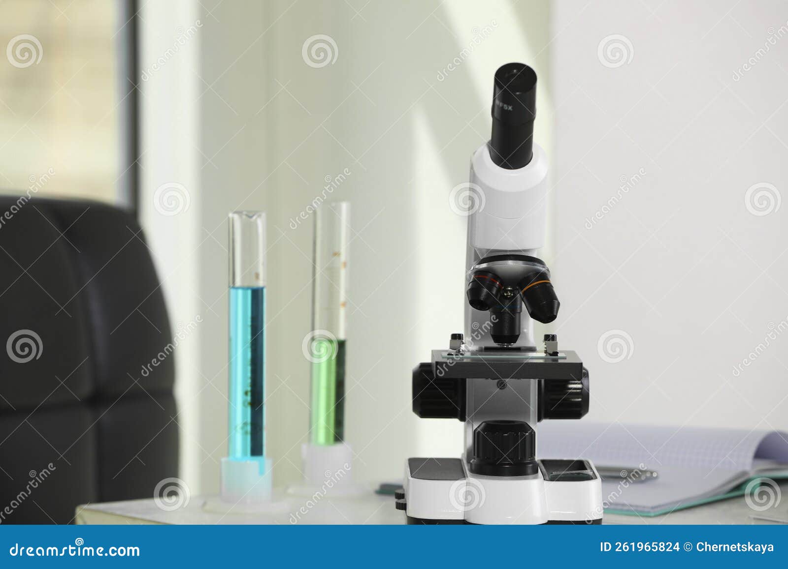 Modern Microscope with Glass Slide on White Table in Laboratory, Space ...