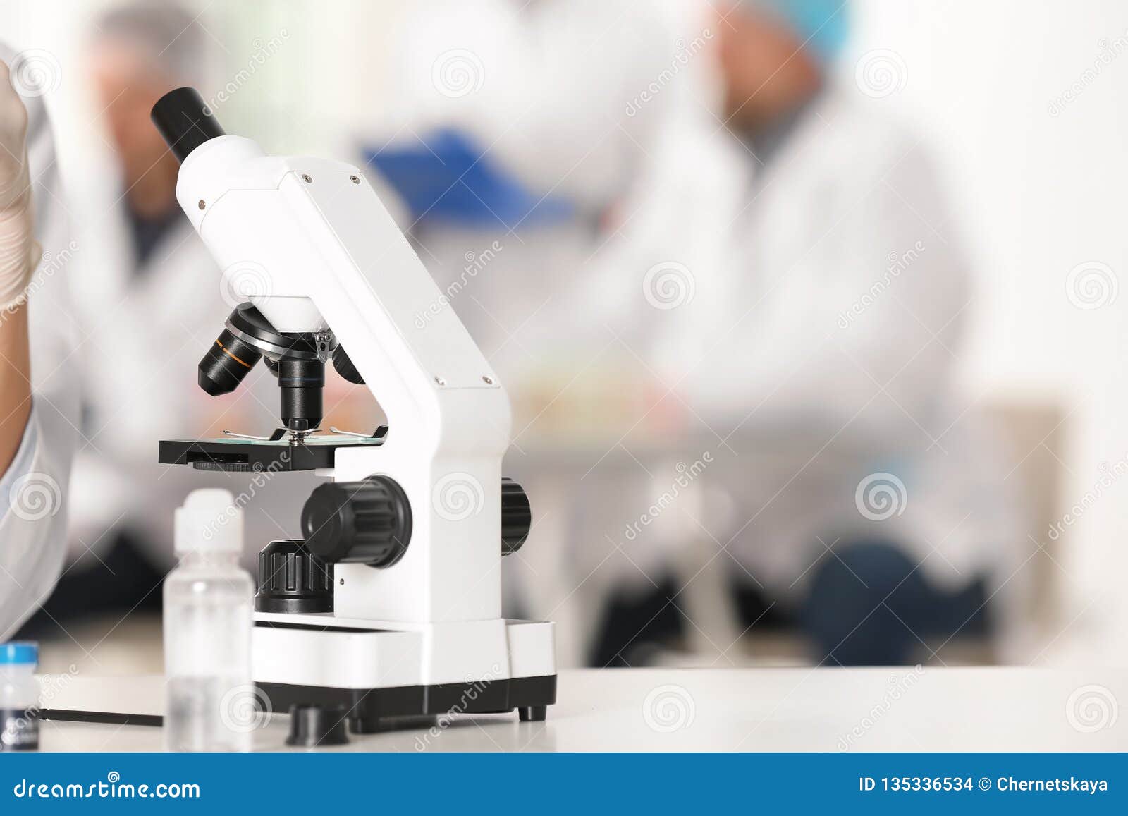 Modern Microscope on Table in Laboratory, Space for Text Stock Photo ...