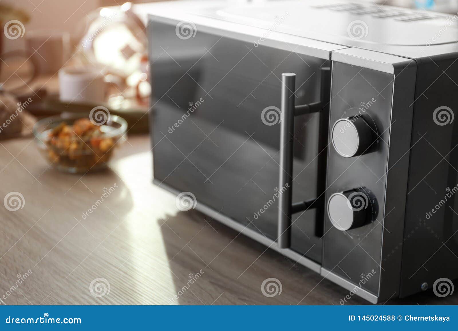 Modern Microwave Oven on Table Stock Photo - Image of heat ...