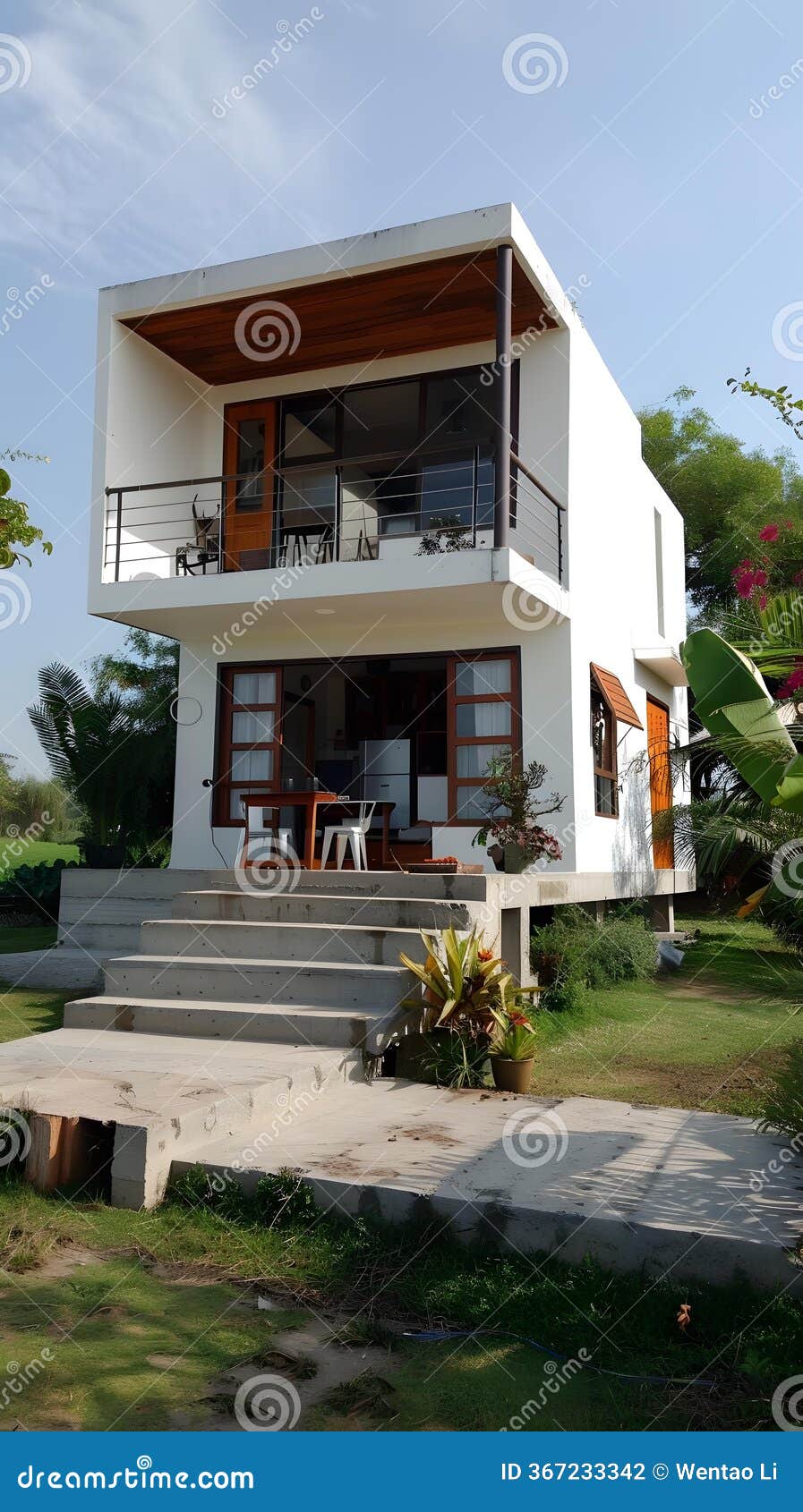 Two Storey White Kitchen Interior With Island And Table Stock Image ...