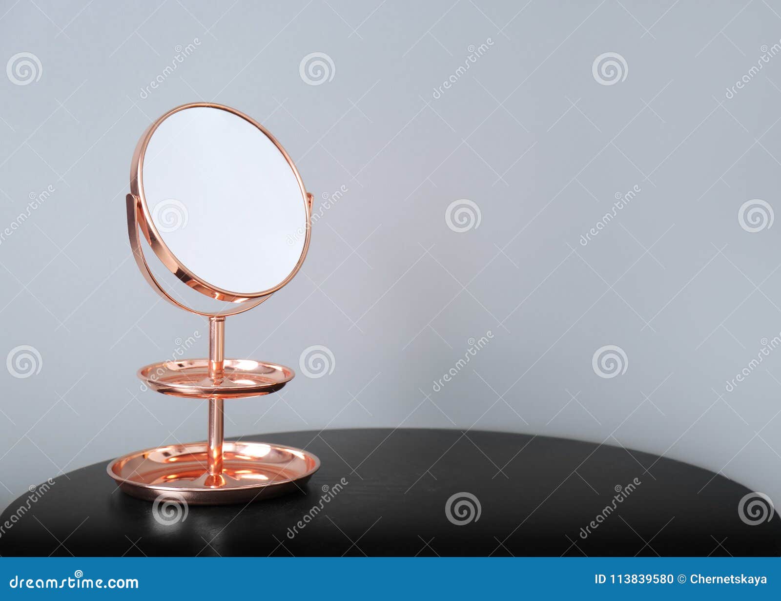 Modern mirror on table stock photo. Image of color, mirror - 113839580