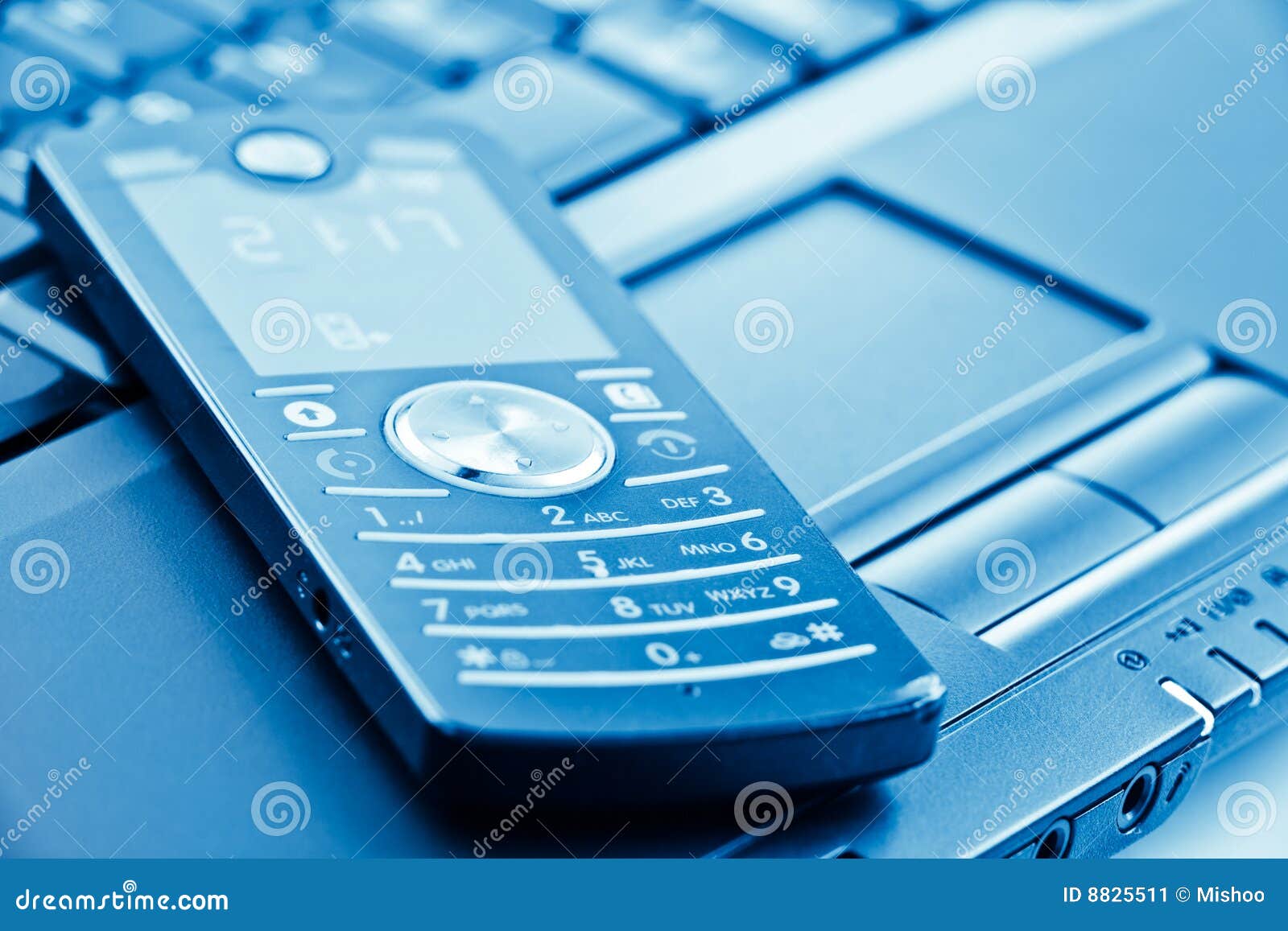 Modern Mobile Phone on Laptop Stock Image - Image of office, cell: 8825511
