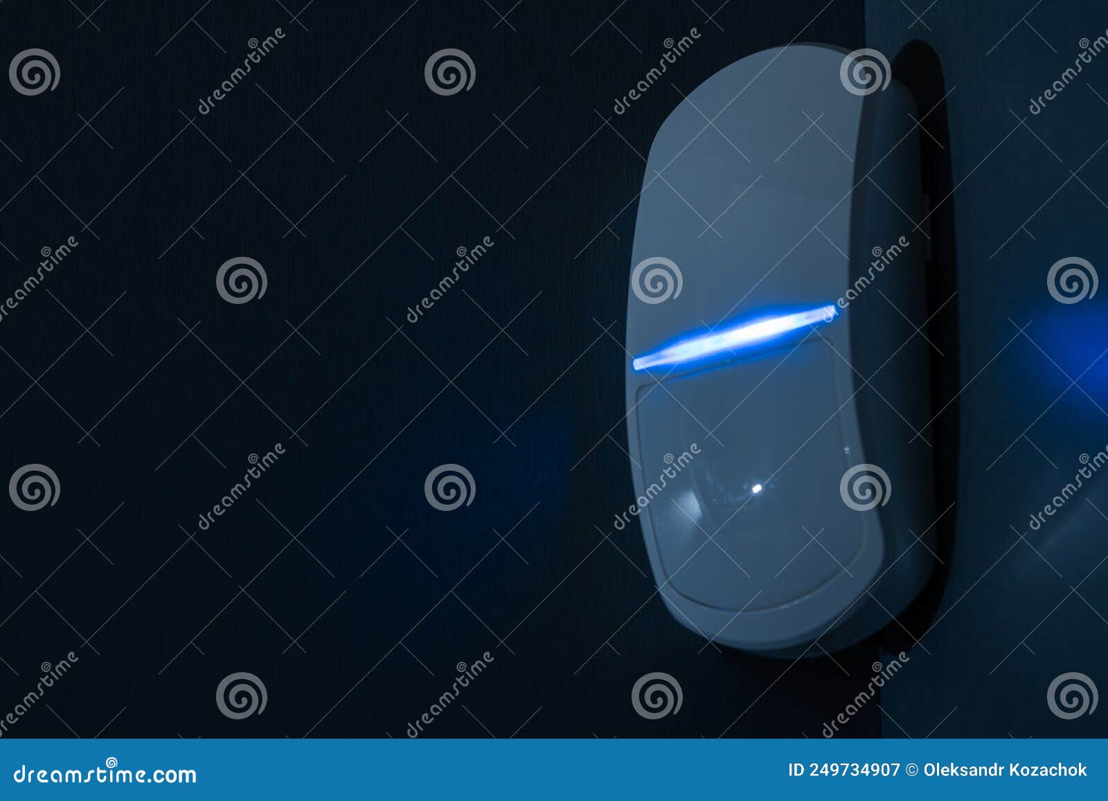 Modern Motion Sensor in Action in a Dark Room. Stock Image - Image of ...