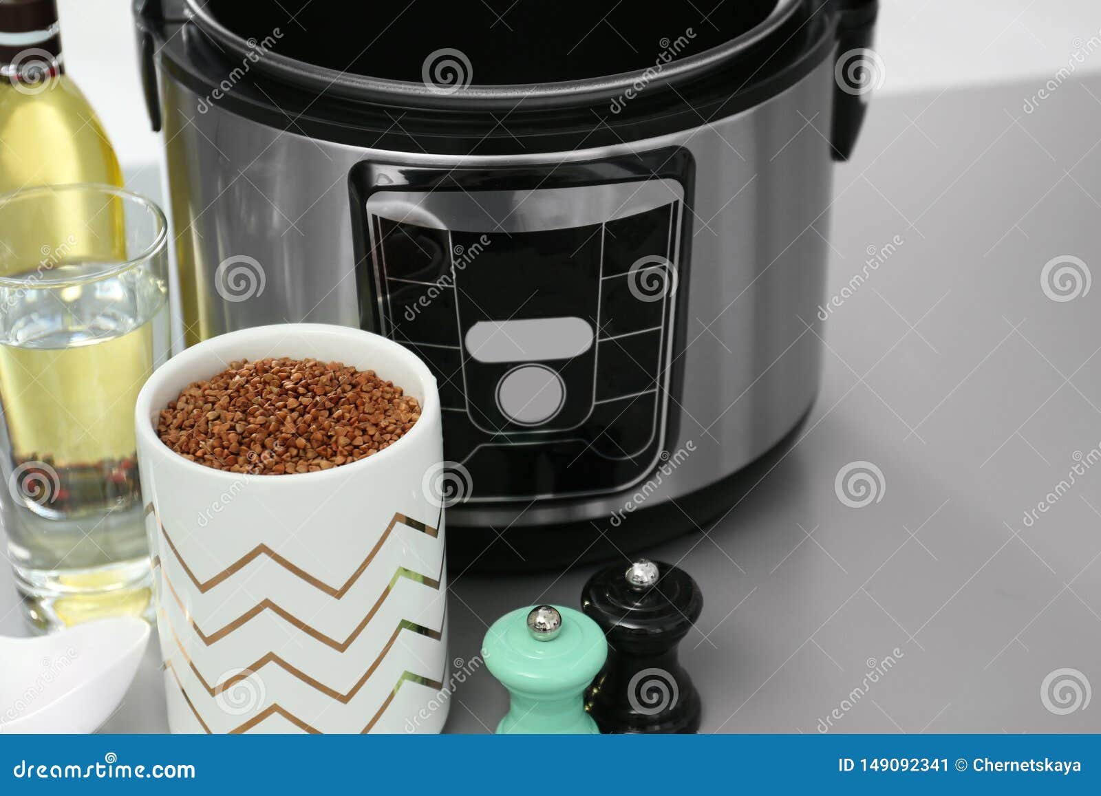 Modern Multi Cooker and Ingredients on Table Stock Image - Image of ...
