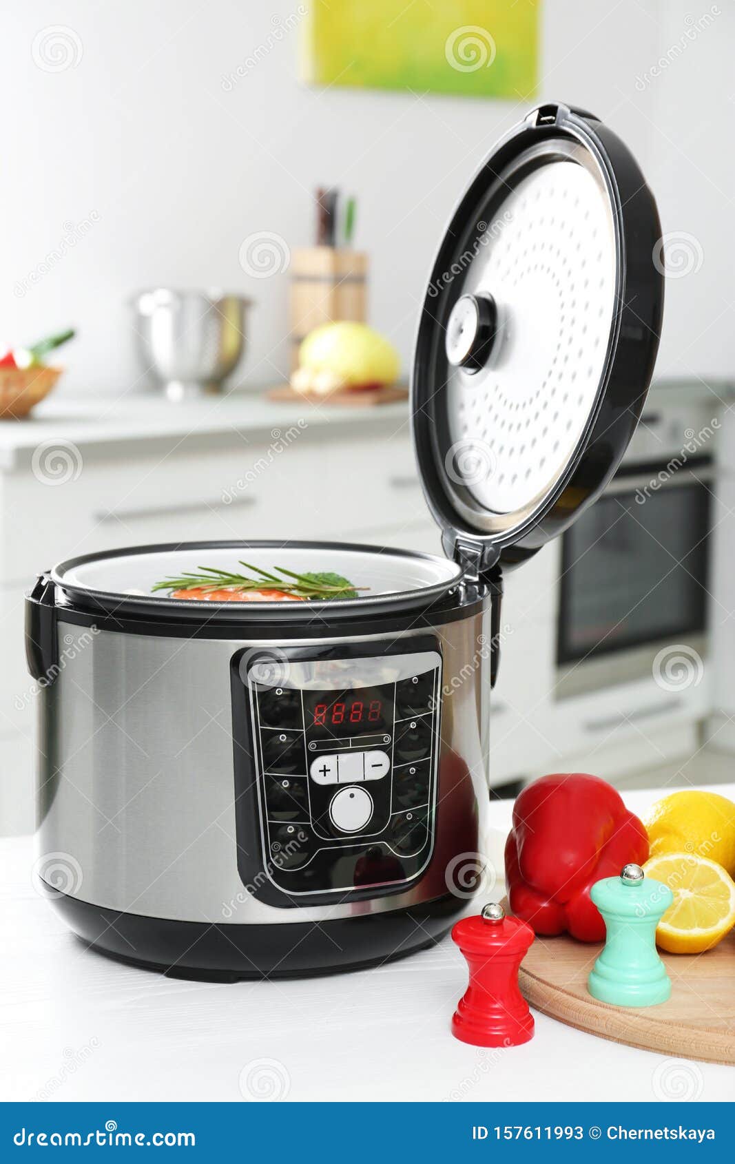 Modern Multi Cooker and Products on Table Stock Image - Image of ...