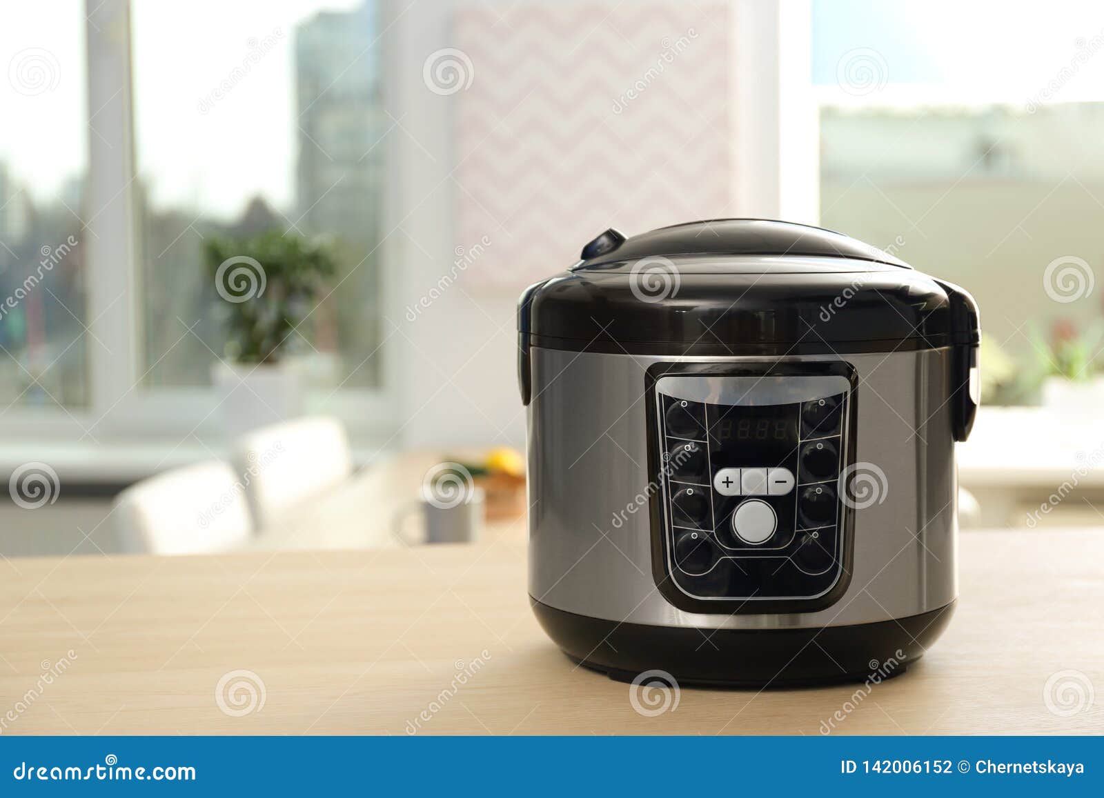 Modern Multi Cooker on Table in Kitchen Stock Photo - Image of modern ...