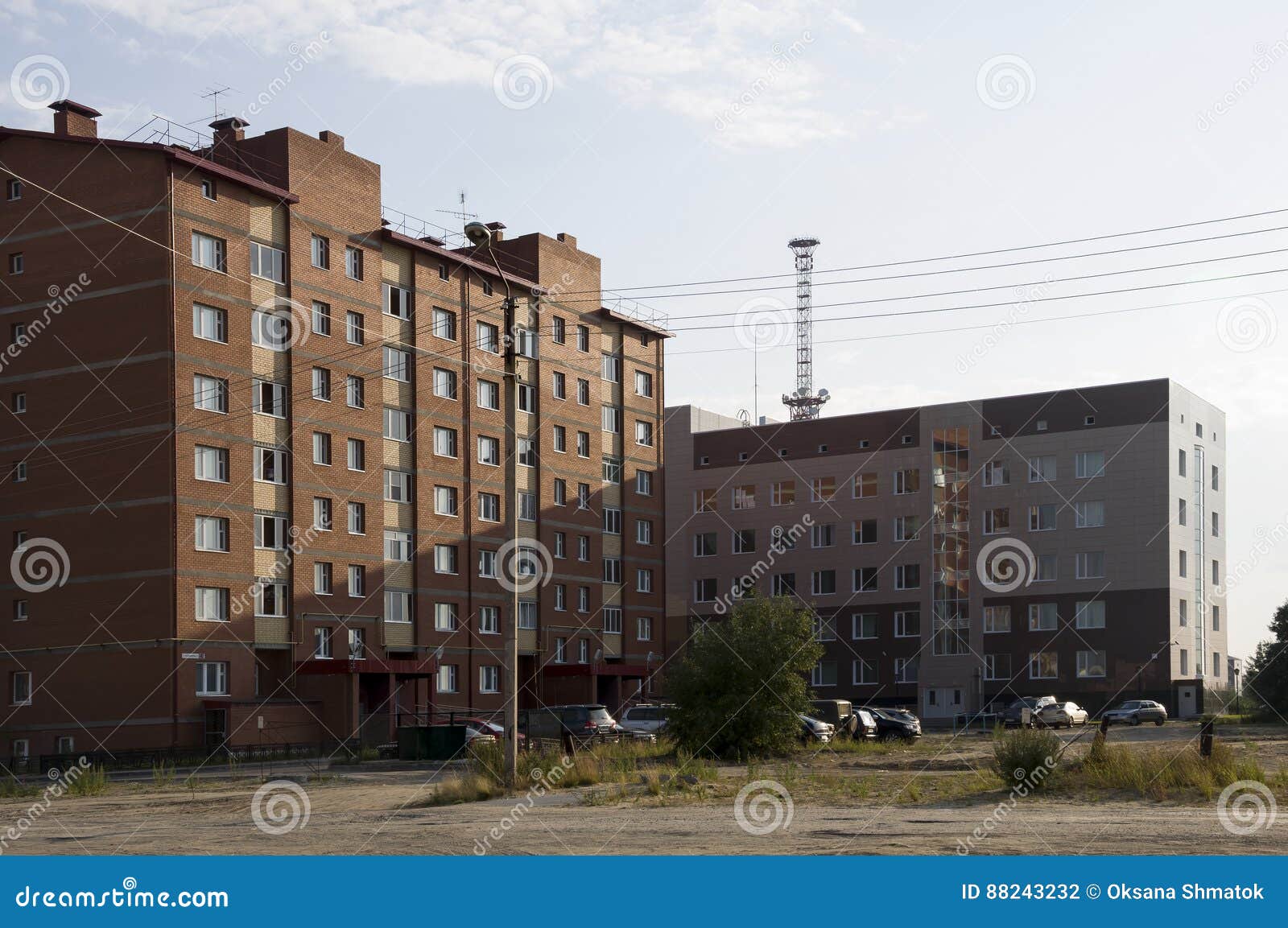 Modern Multi-storeyed Buildings with Telecommunications Tower Behind ...