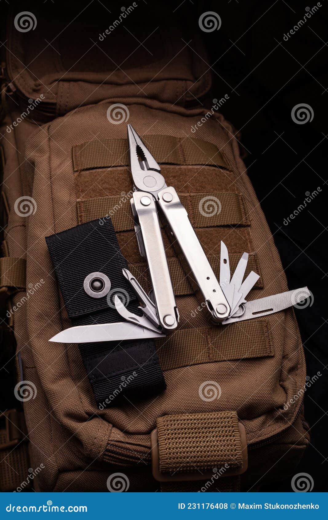 Modern Multitool with Many Tools. a Portable Multitasking Tool Lie on a ...