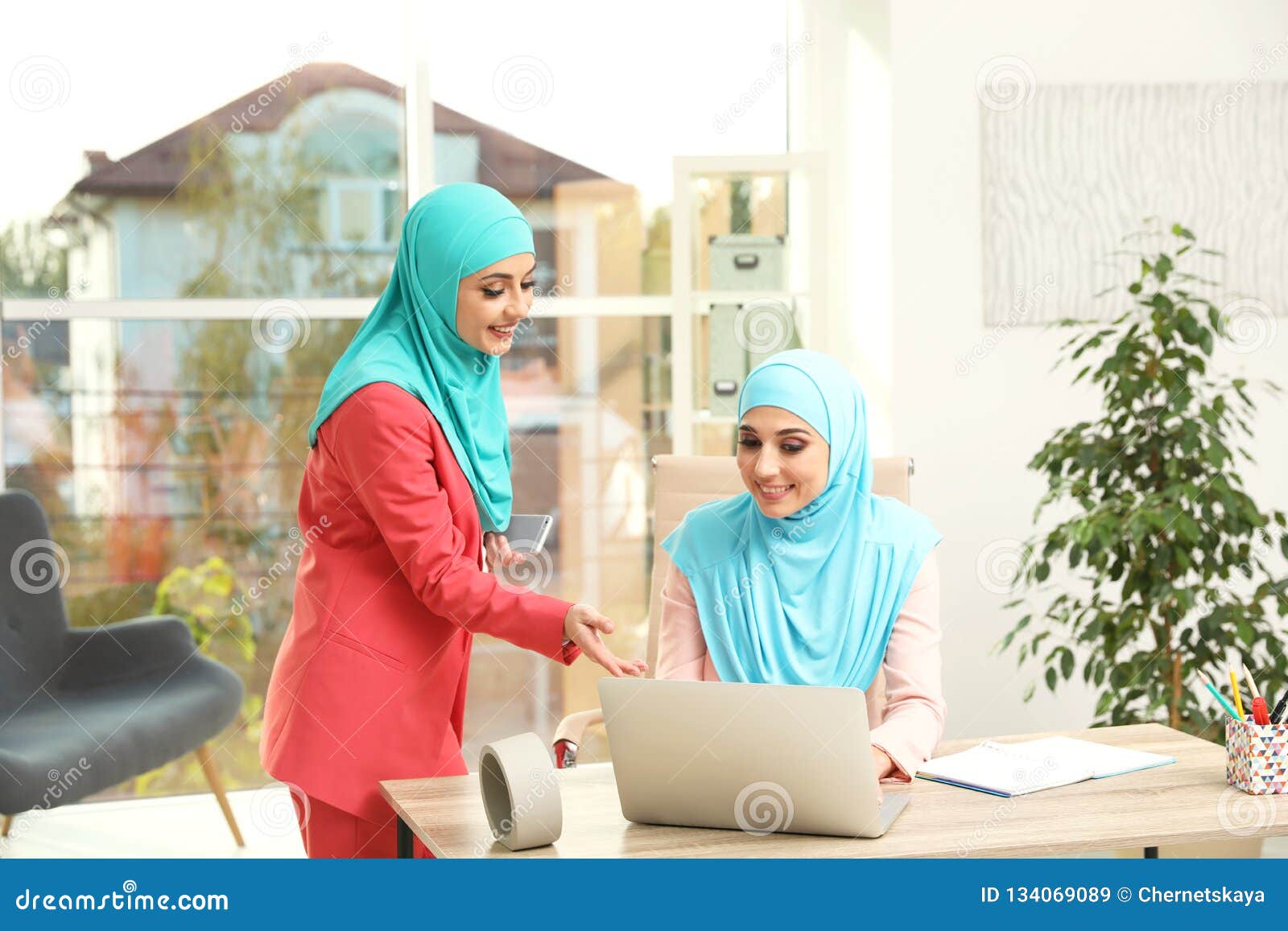 Modern Muslim Women Working in Office Stock Image - Image of desk, face ...