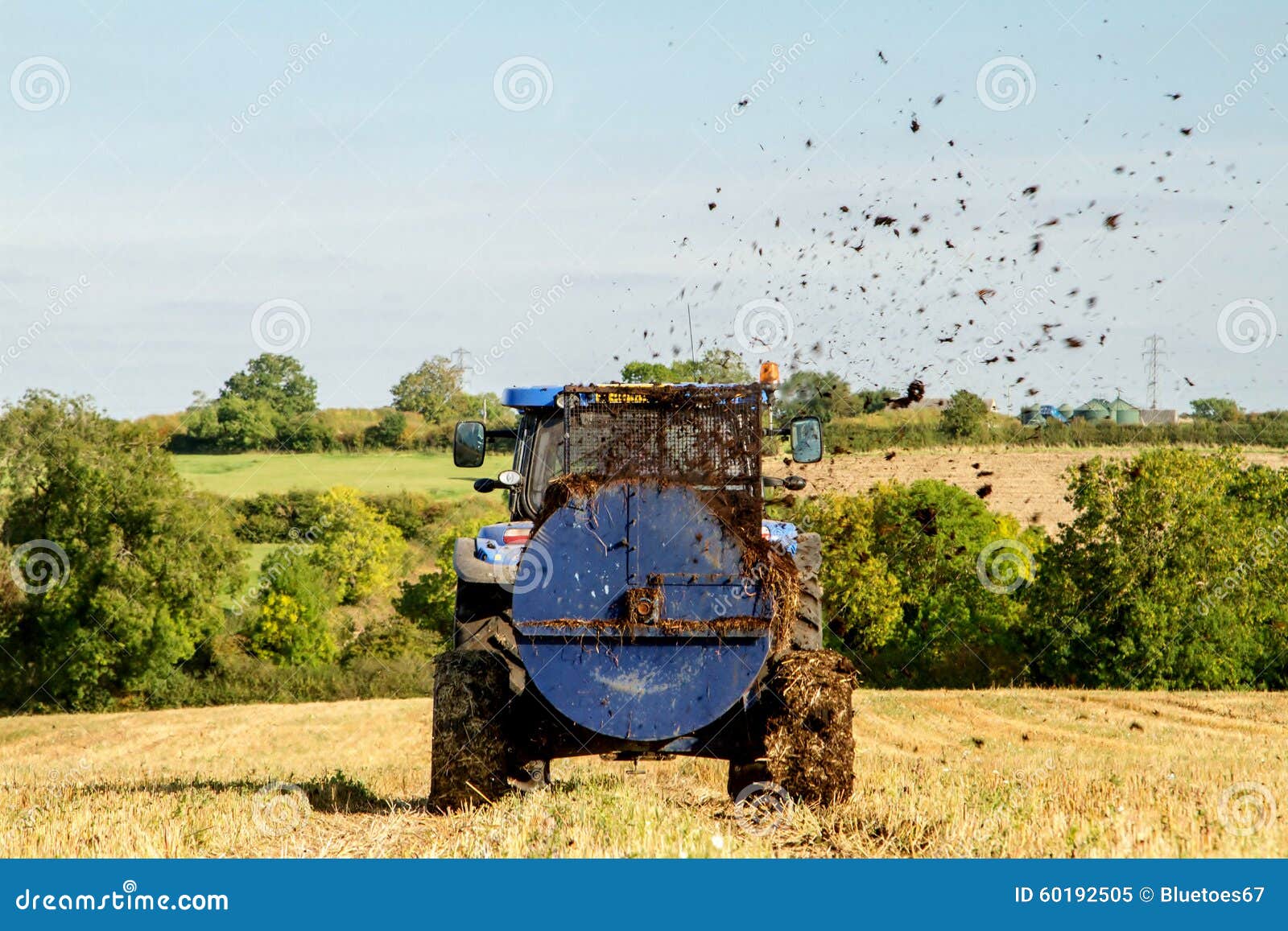 Modern New Holland Tractor Tractor Spreading Manure on Fields Editorial ...