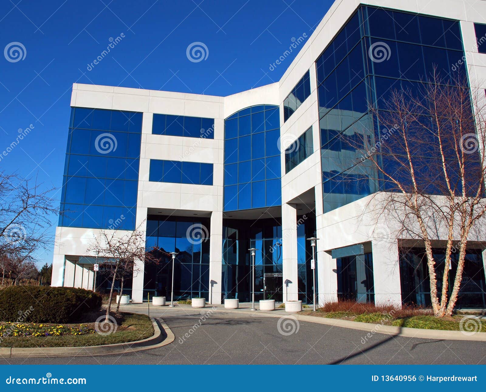 Red Stucco Office Building Facade With Windows And Metal Roof. Wooden ...