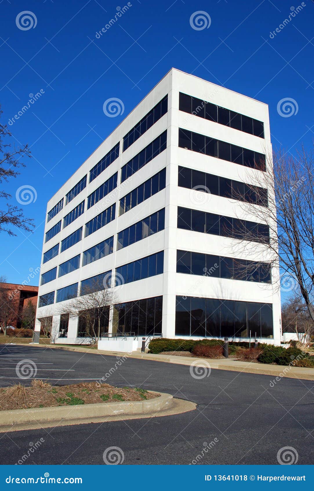 Red Stucco Office Building Facade With Windows And Metal Roof. Wooden ...