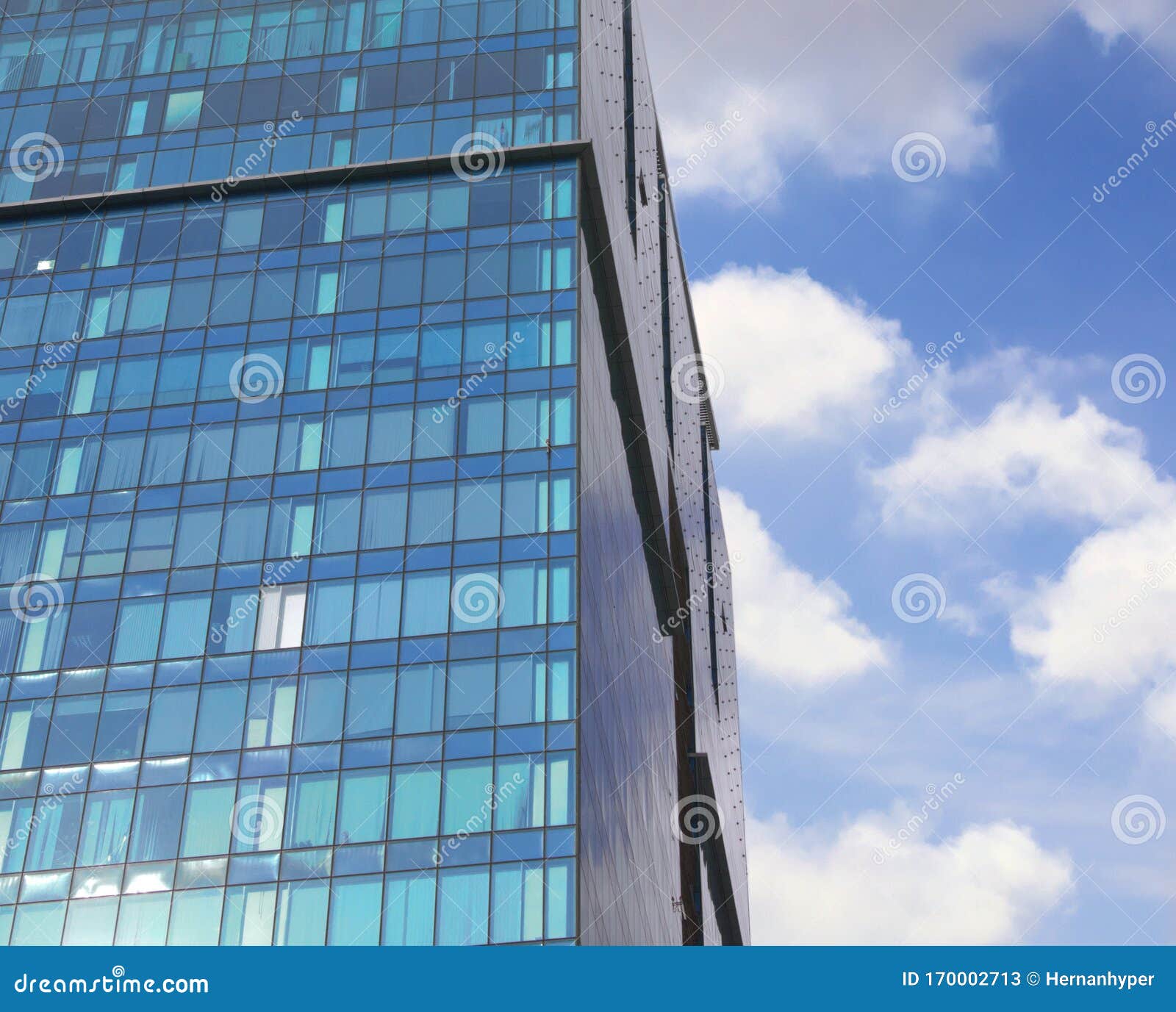 Modern Office Building Exterior. Blue Glass Facade and Blue Sky with ...