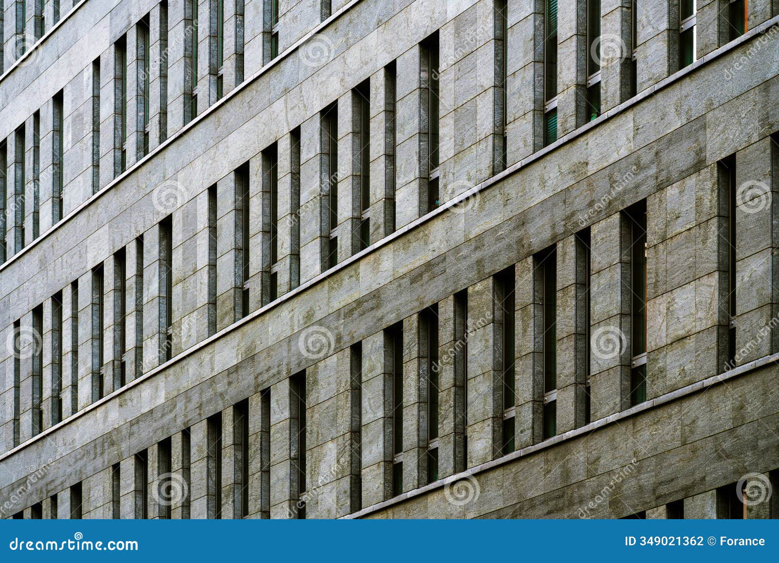 Modern Office Building Facade with Repetitive Windows and Stone ...