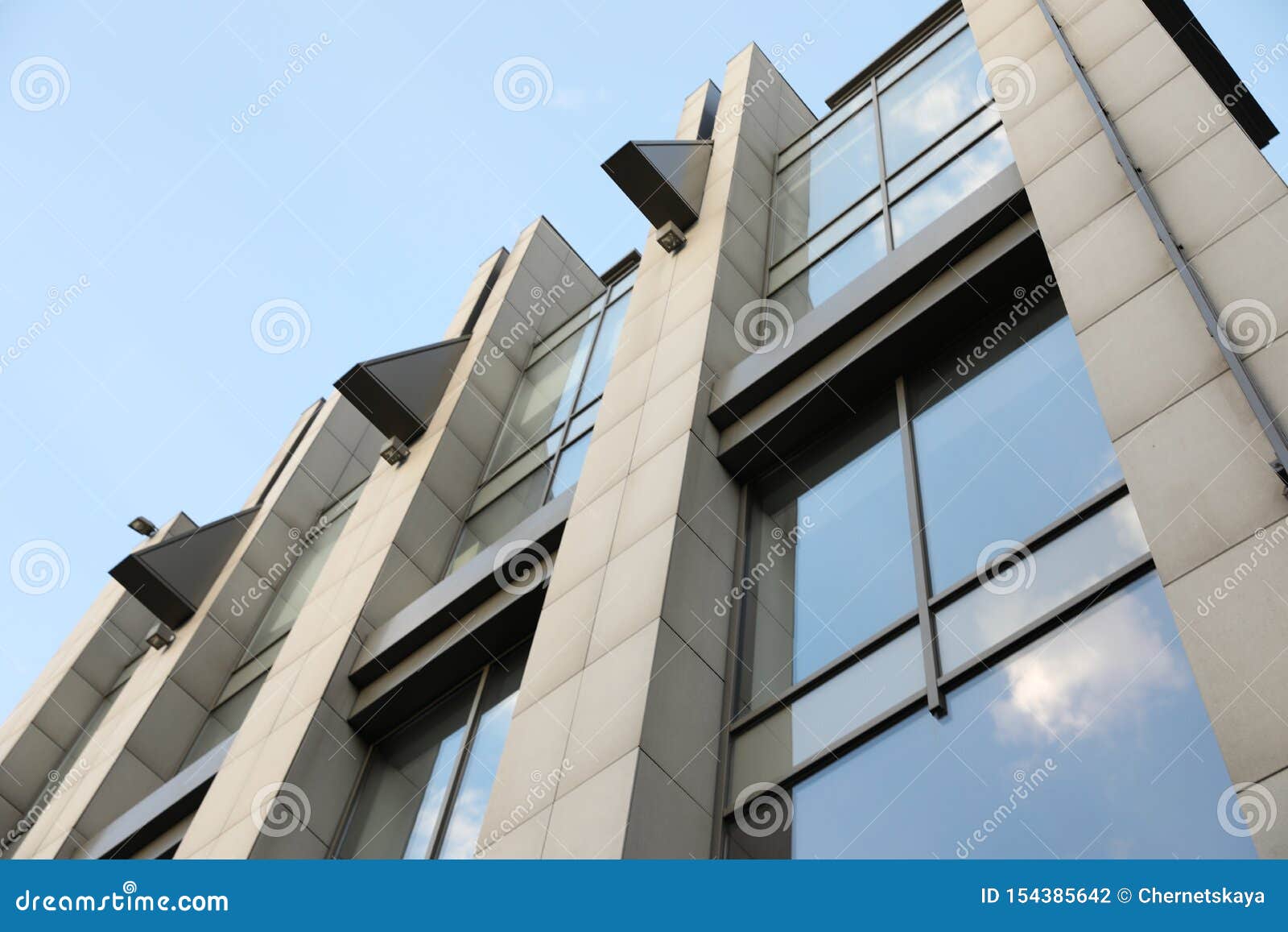 Modern Office Building with Tinted Windows on Sunny Stock Photo - Image ...