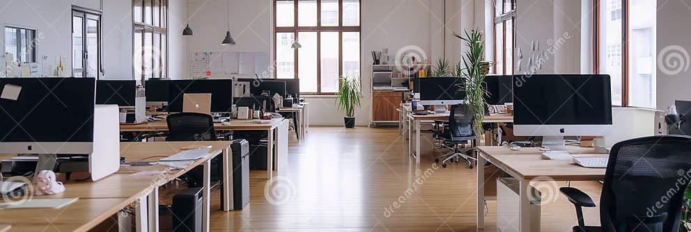 Modern Office Interior with Empty Workstations and Natural Light Stock ...