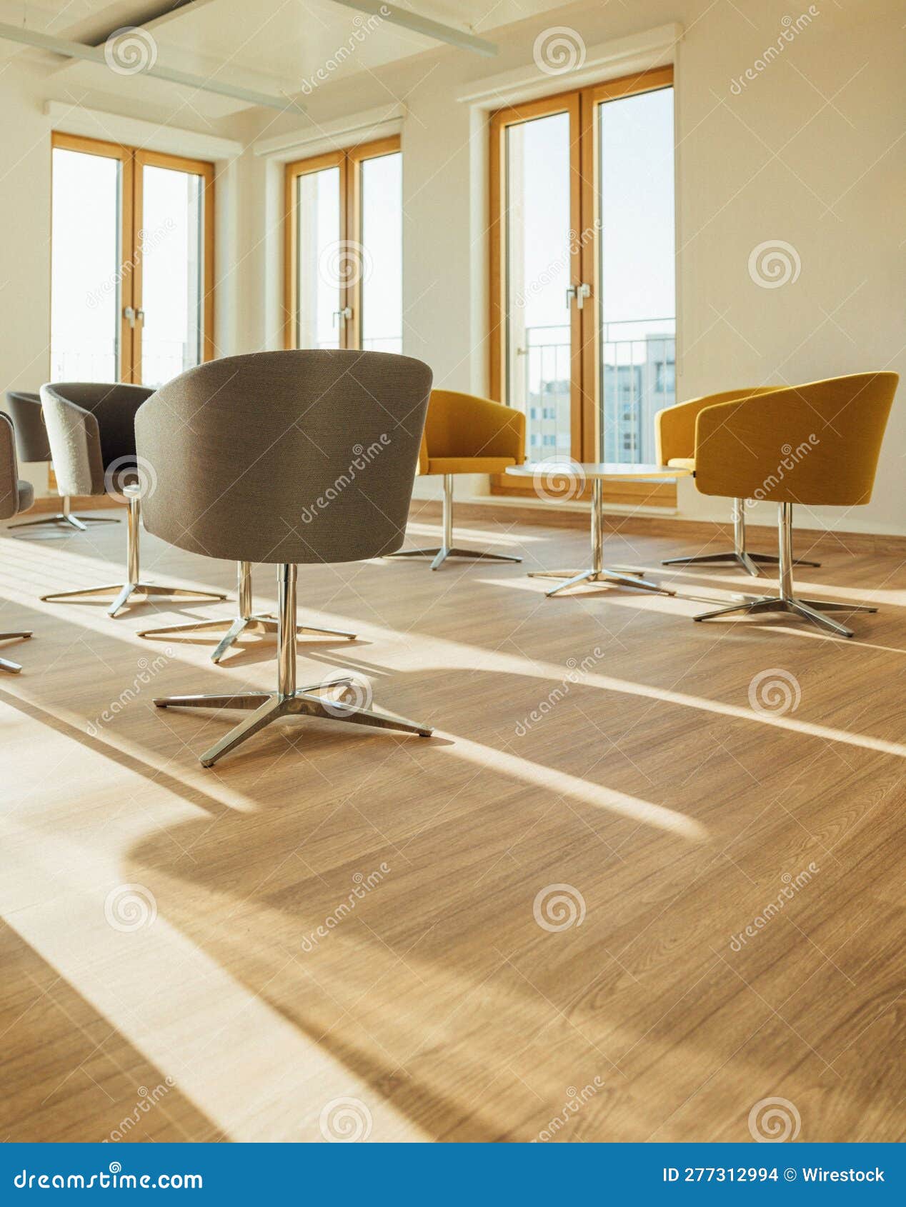 Modern Office Interior with Several Chairs Arranged Around Tables Stock ...