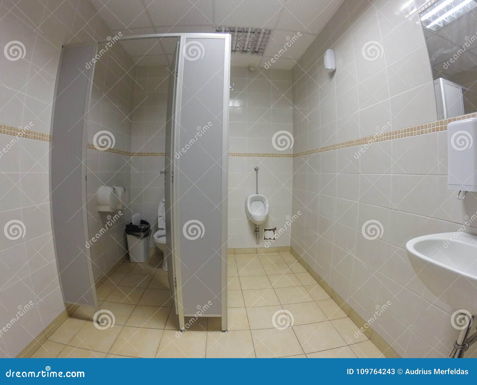 Modern office restroom stock image. Image of toilet - 109764243