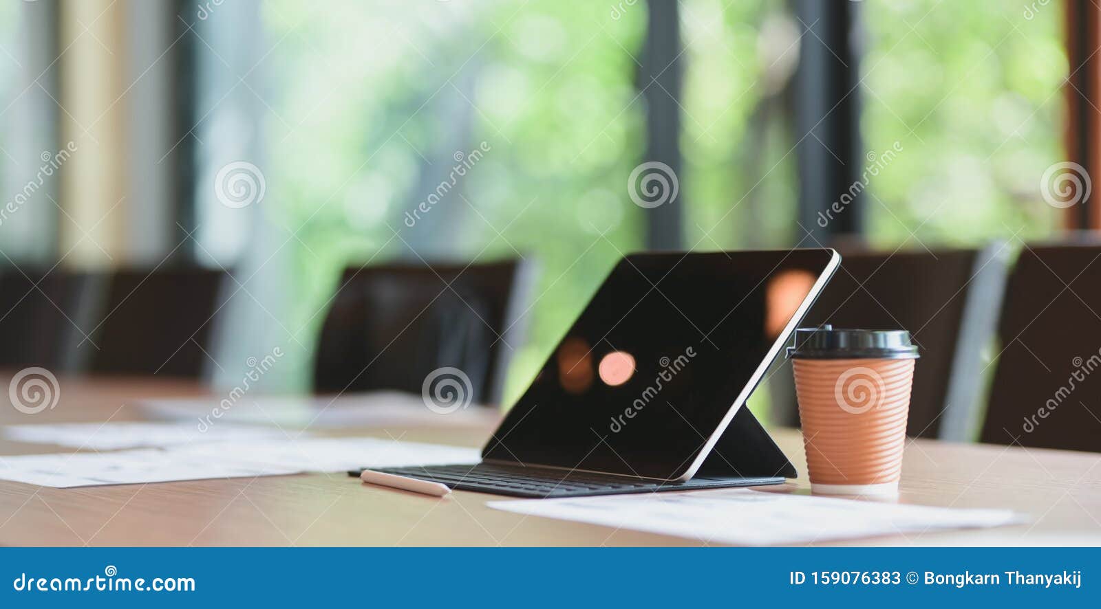 Modern Office Room with Tablet, a Cup of Coffee and Document on Wooden ...