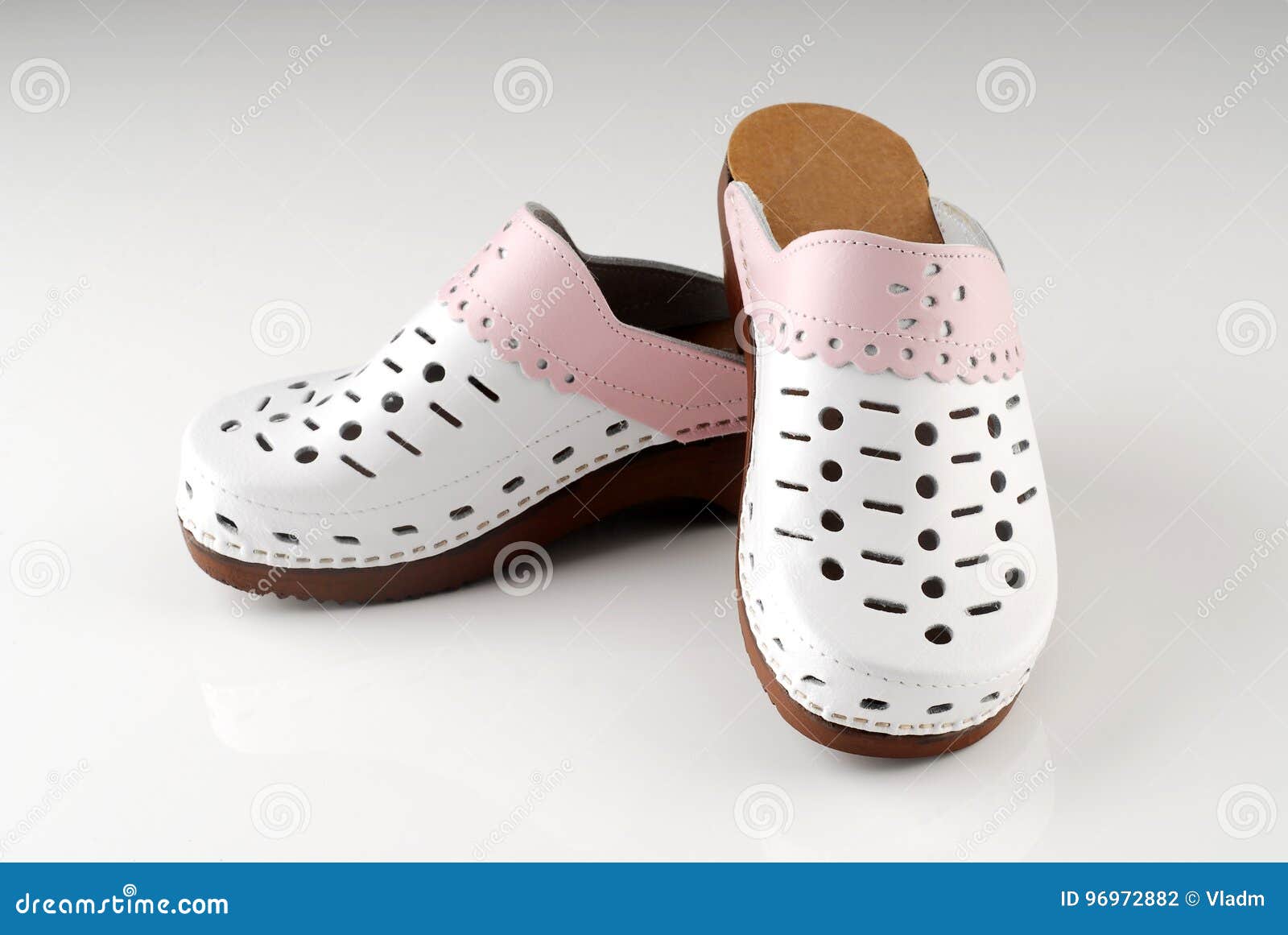 Modern pair of clogs stock photo. Image of shoe, female - 96972882