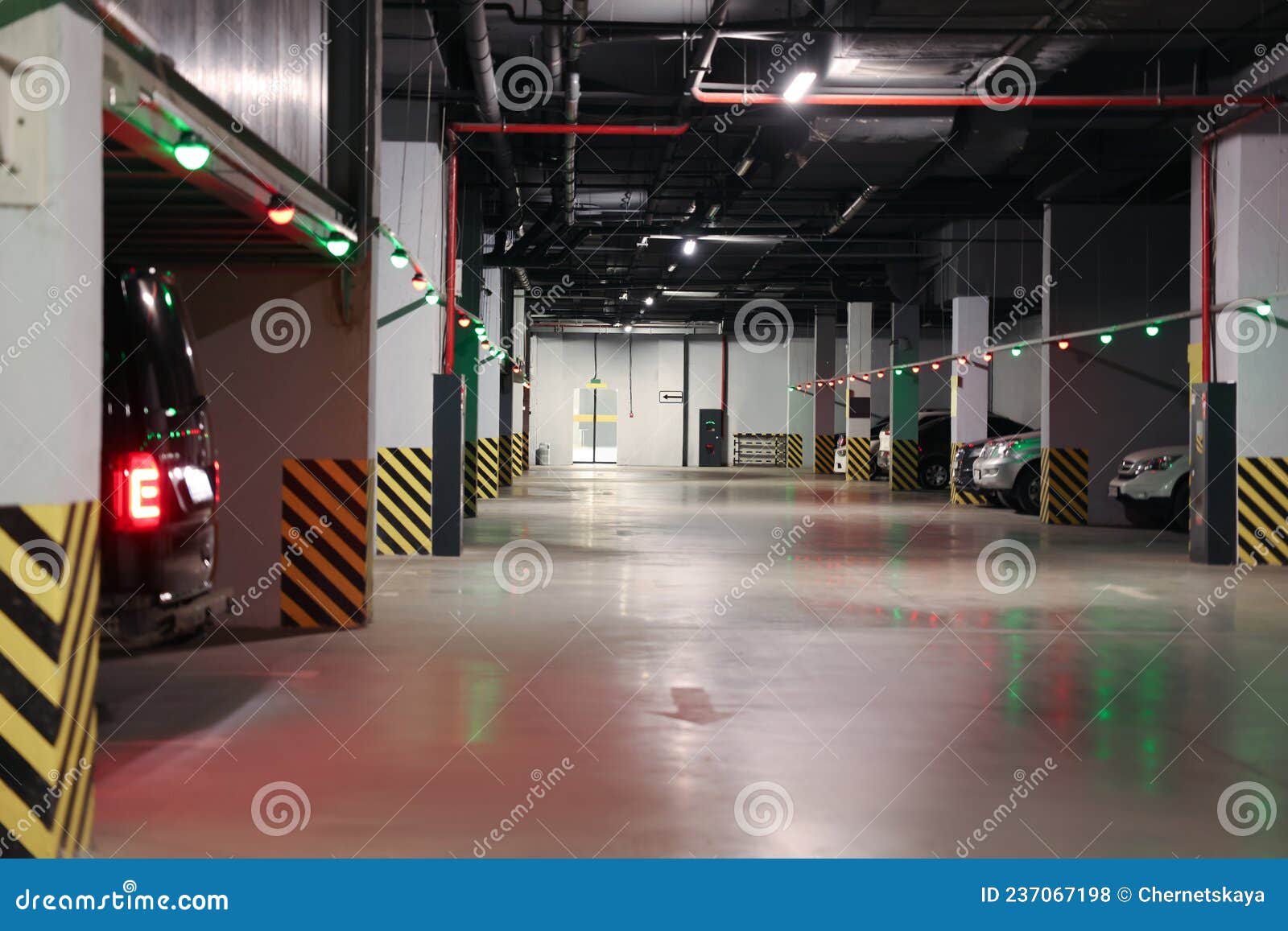 Modern Parking Garage with Cars at Night Stock Photo - Image of ...