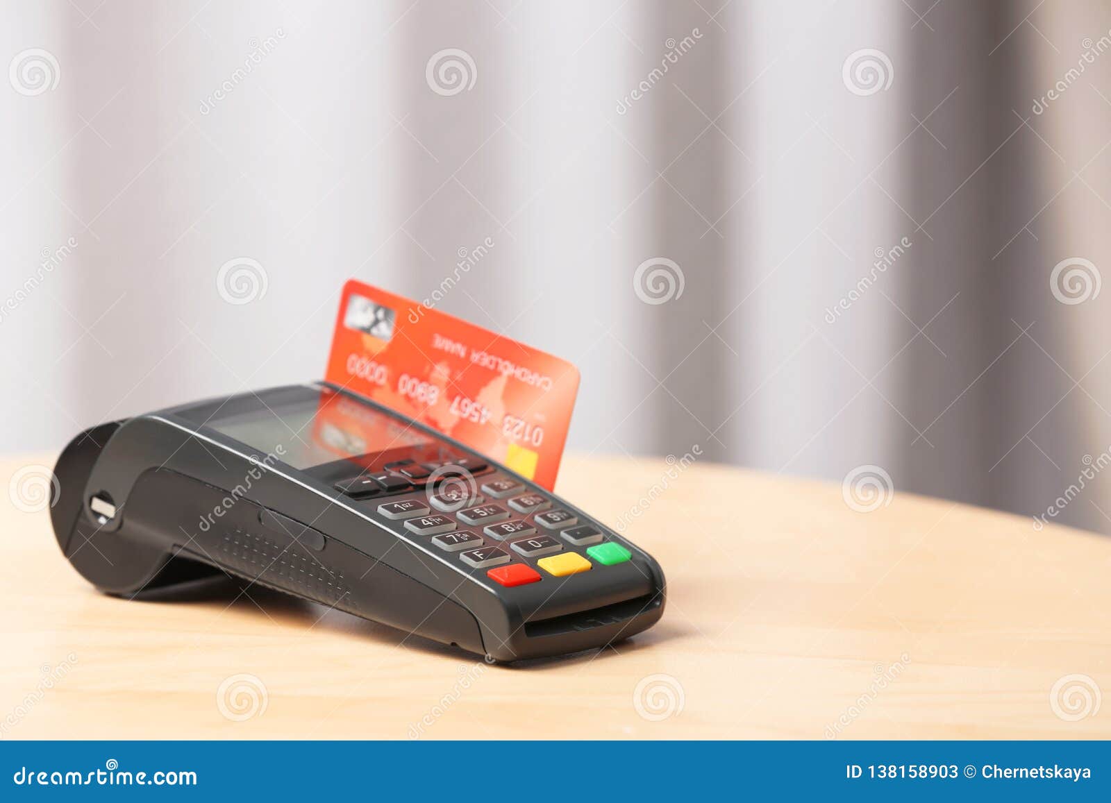 Modern Payment Terminal with Credit Card on Table. Space for Text Stock ...
