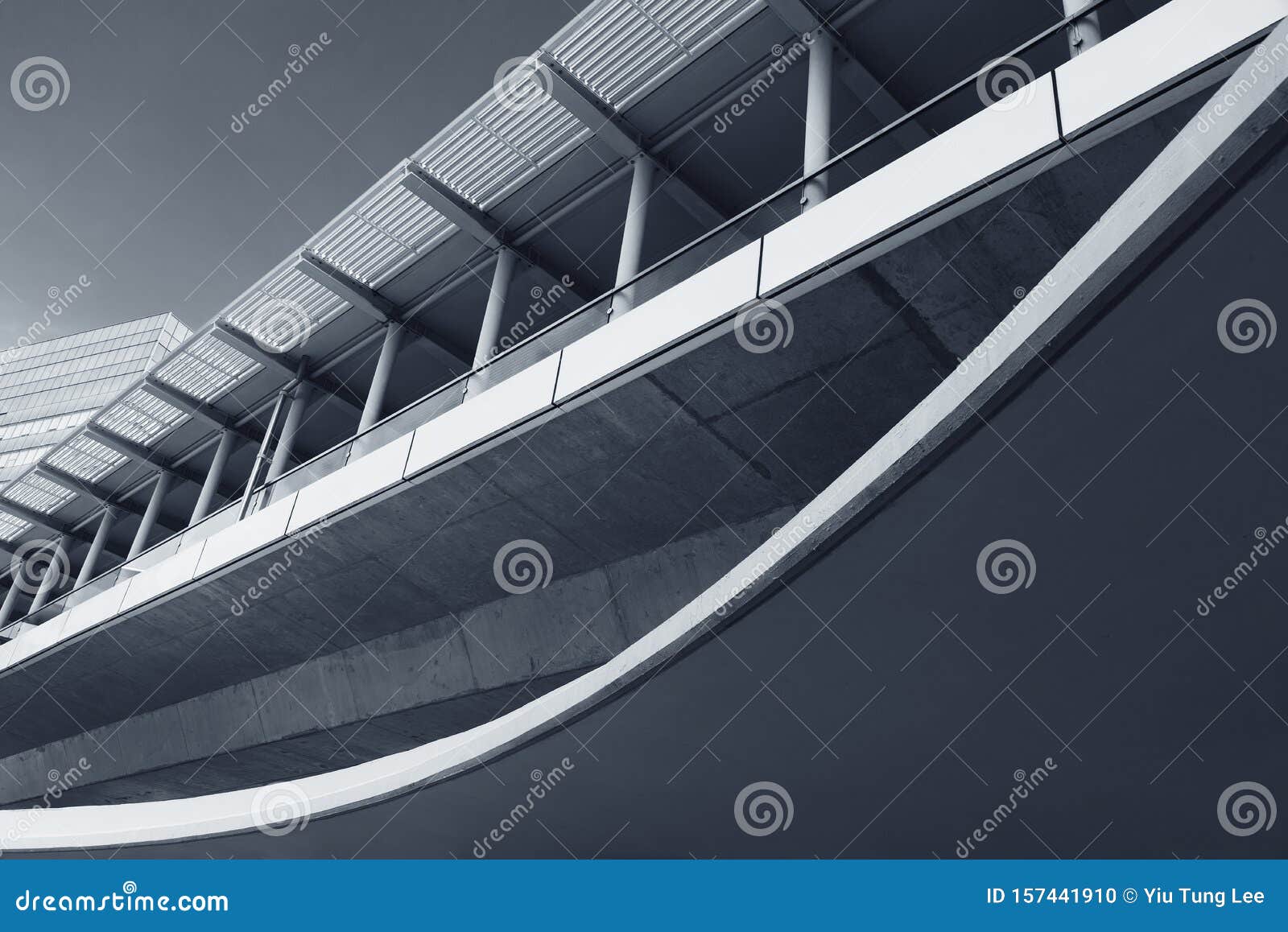 Modern pedestrian walkway stock photo. Image of bridge - 157441910