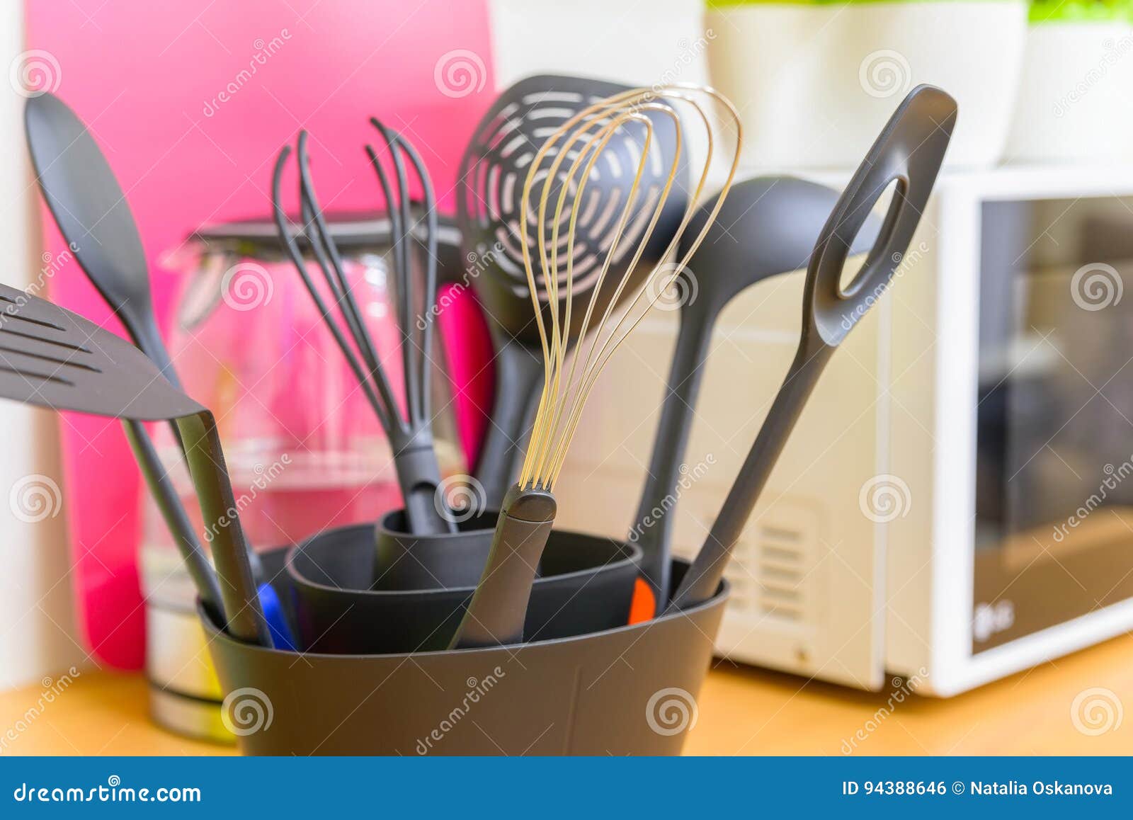 Modern Plastic Kitchen Utensils in Stand Stock Photo - Image of ...