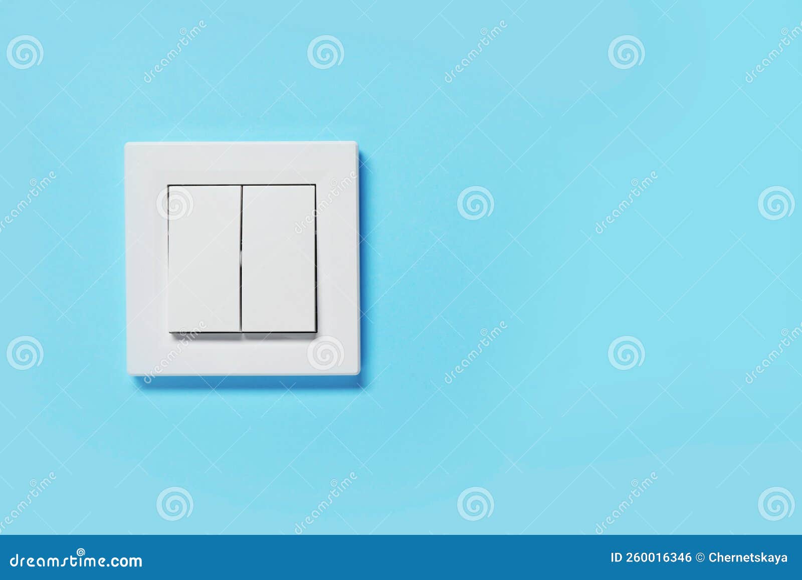 Modern Plastic Light Switch on Blue Wall, Space for Text Stock Photo ...