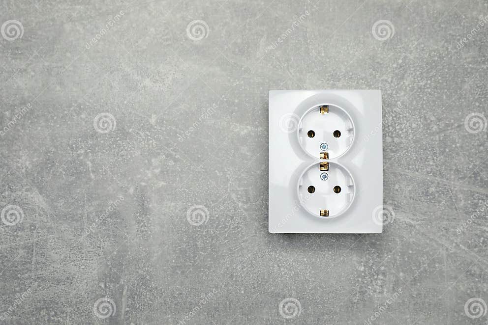 Modern Plastic Power Socket on Grey Table, Top View. Space for Text ...