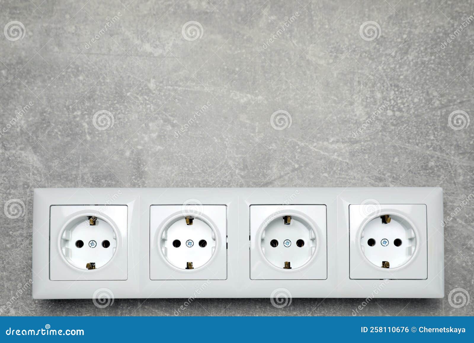 Modern Plastic Power Socket on Grey Table, Top View. Space for Text ...