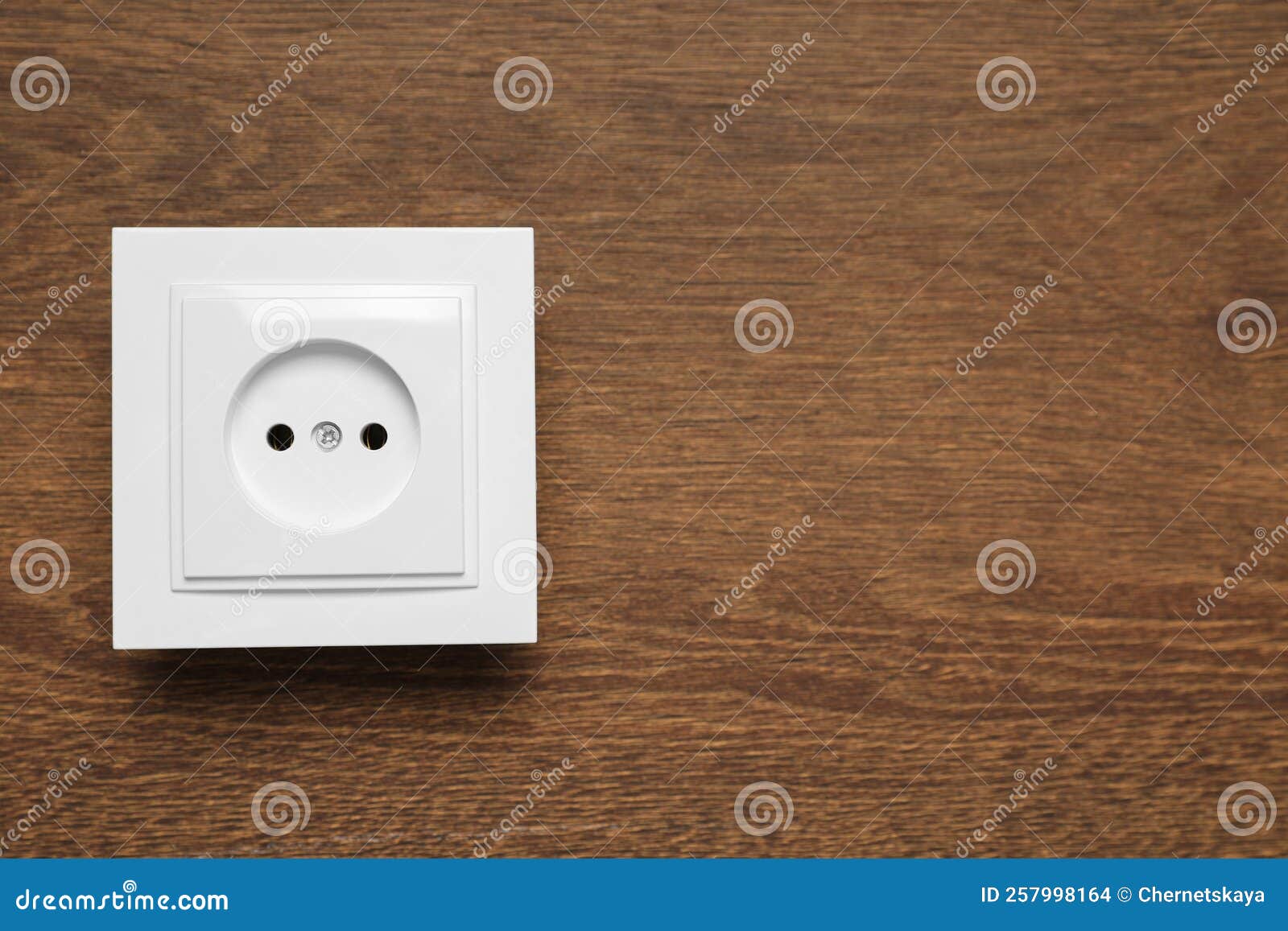 Modern Plastic Power Socket on Wooden Table, Top View. Space for Text ...