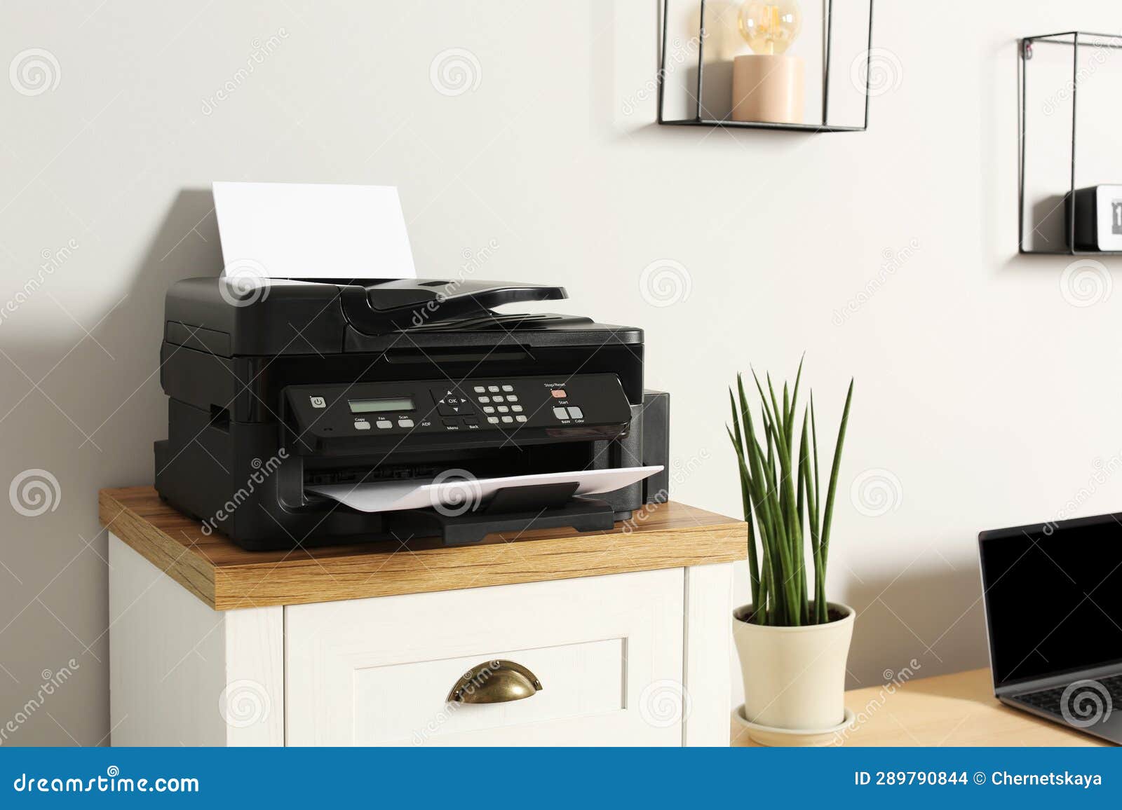 Modern Printer with Paper on Chest of Drawers Indoors Stock Photo ...