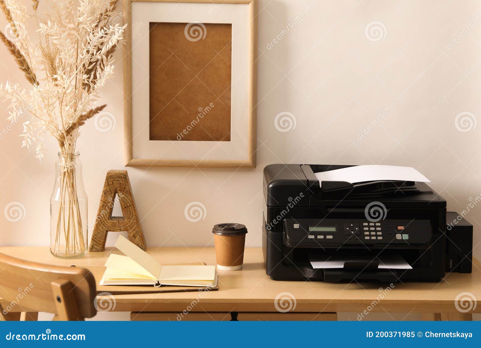 Modern Printer with Paper, Notebook and Cup of Drink on Wooden Table ...