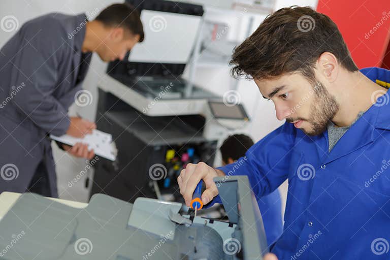 Modern Printing Machine Operator and Apprentice Stock Image - Image of ...