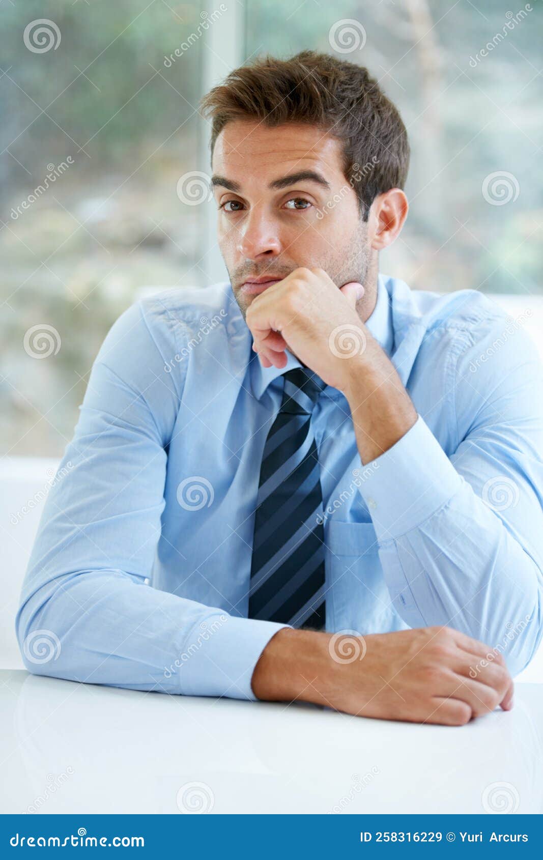 The Modern Professional. a Handsome Young Businessman at Work. Stock ...