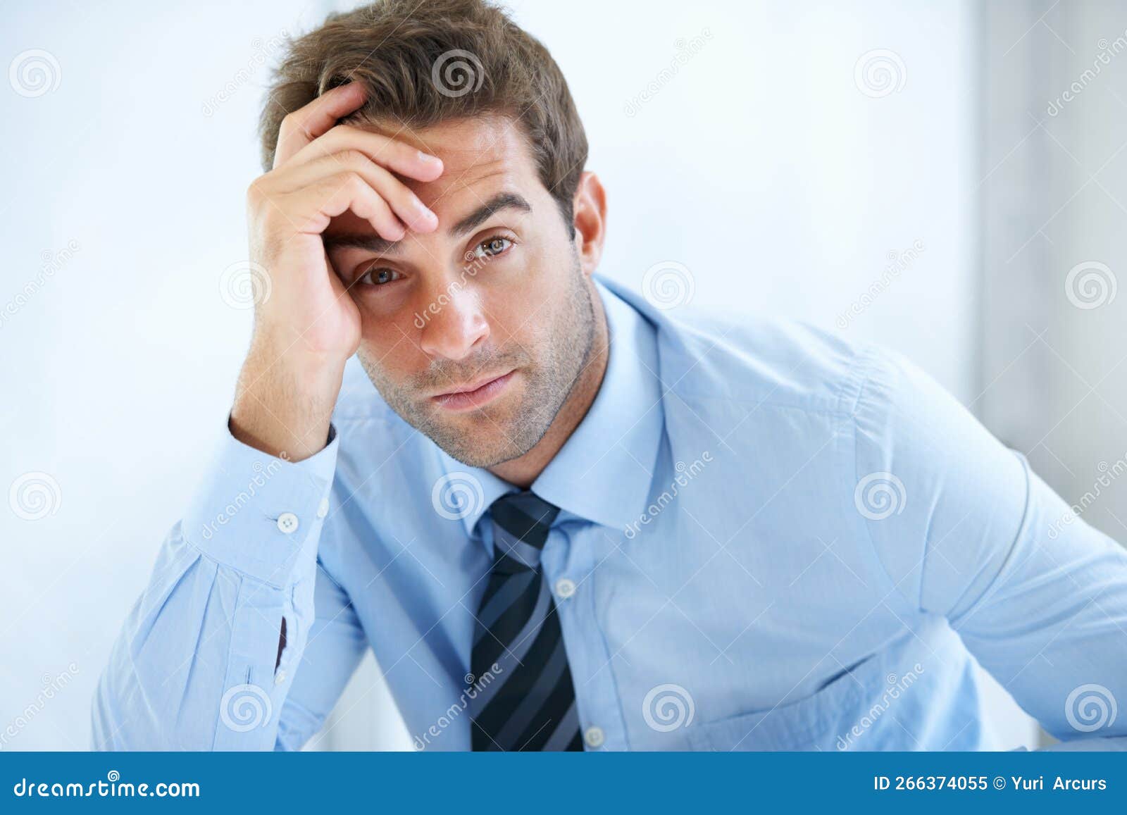 The Modern Professional. a Handsome Young Businessman at Work. Stock ...