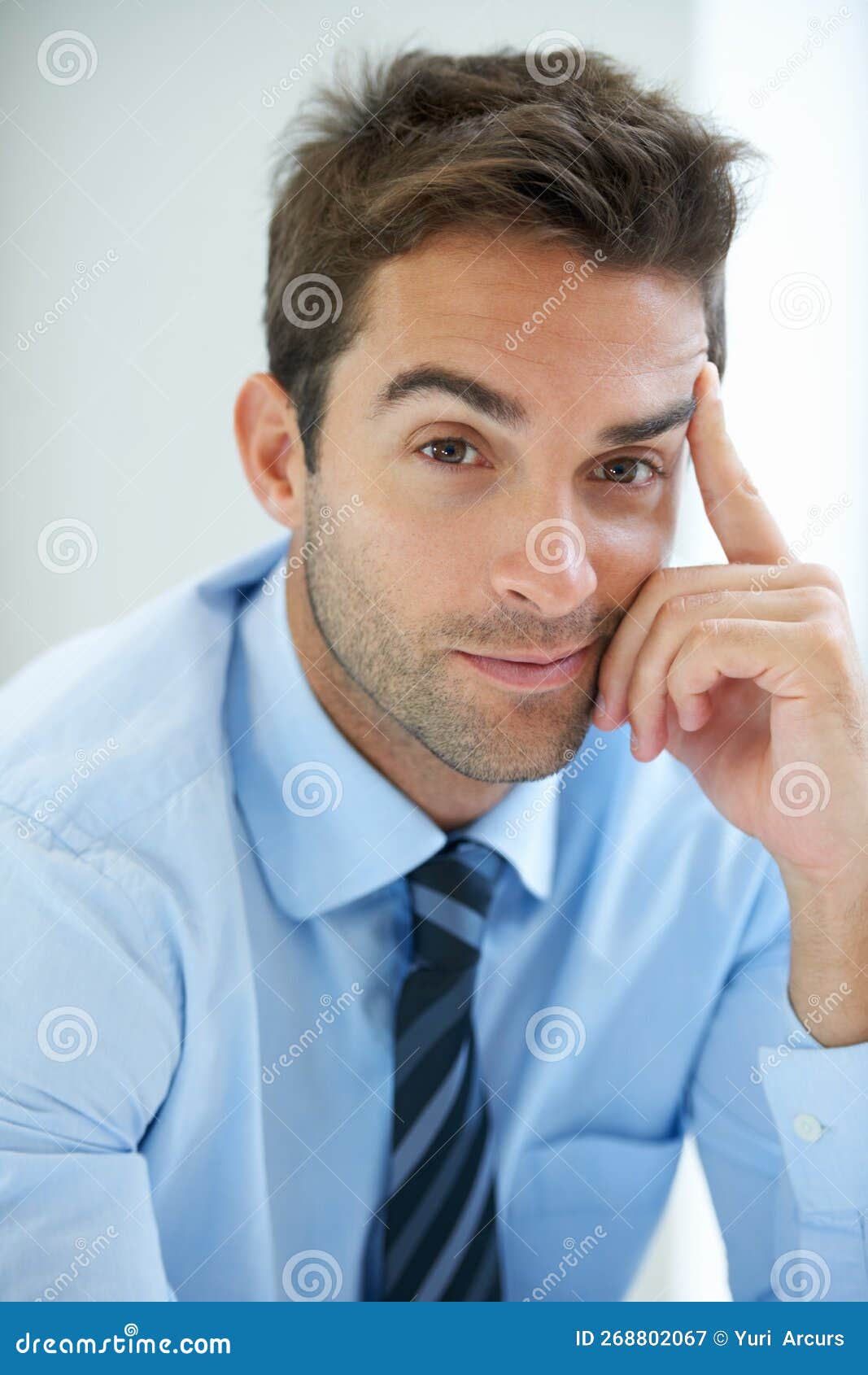 The Modern Professional. a Handsome Young Businessman at Work. Stock ...