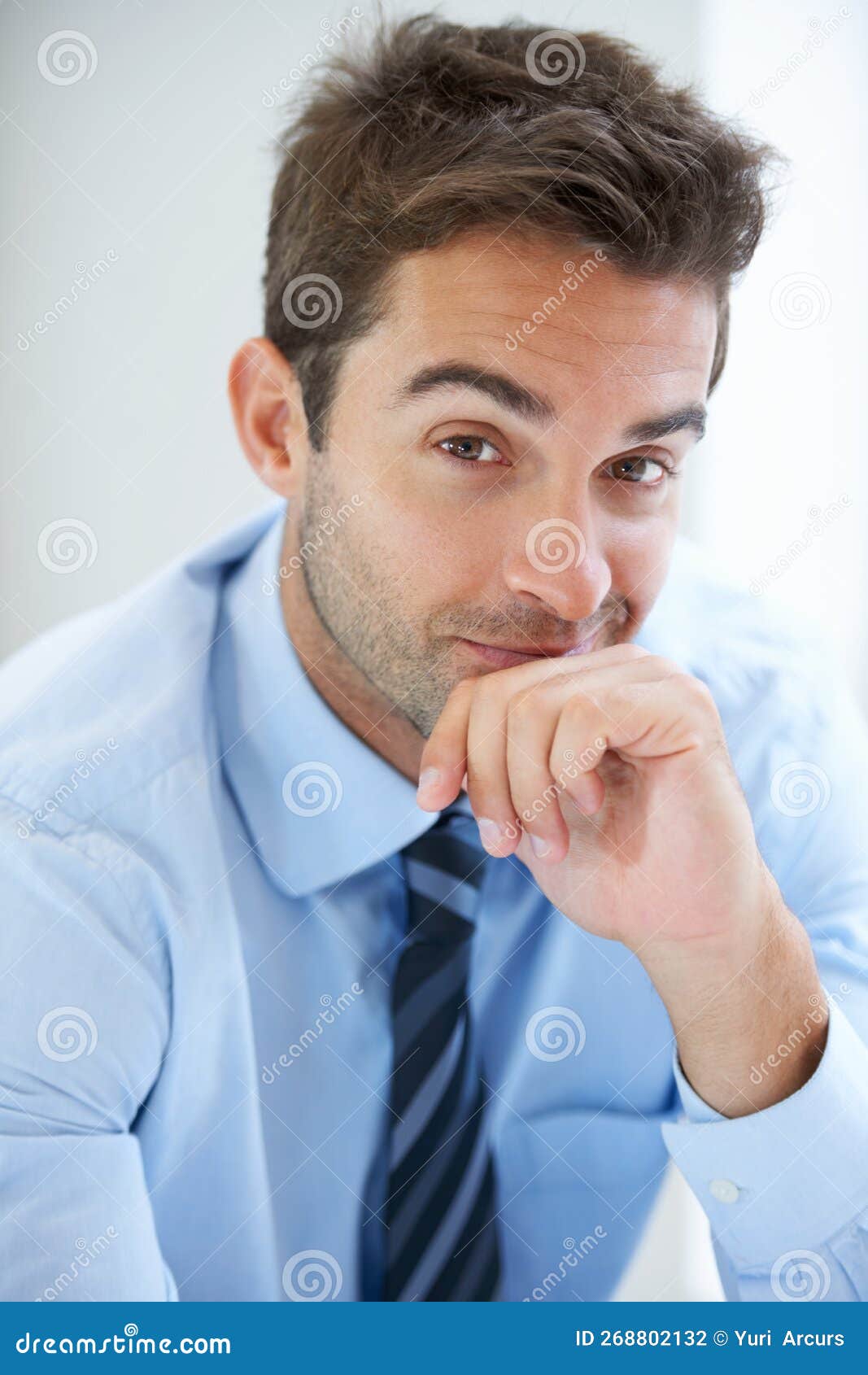 The Modern Professional. a Handsome Young Businessman at Work. Stock ...