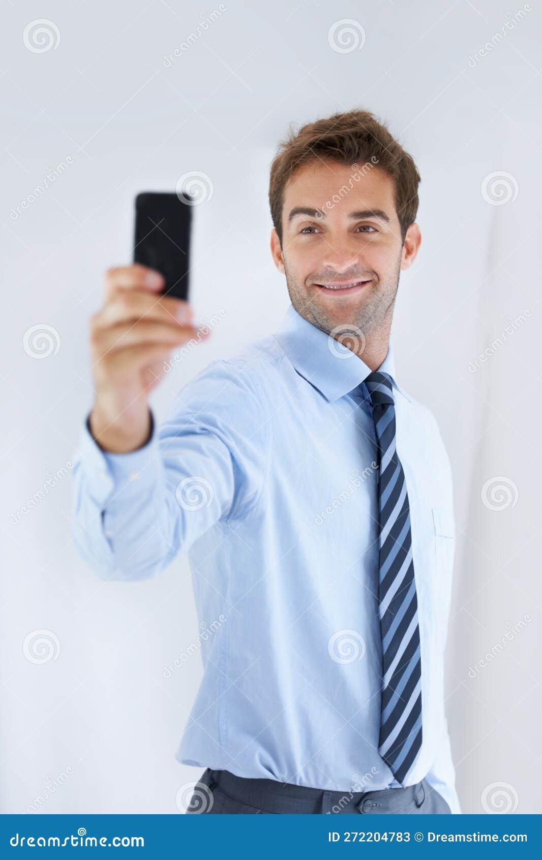 The Modern Professional. a Handsome Young Businessman at Work. Stock ...