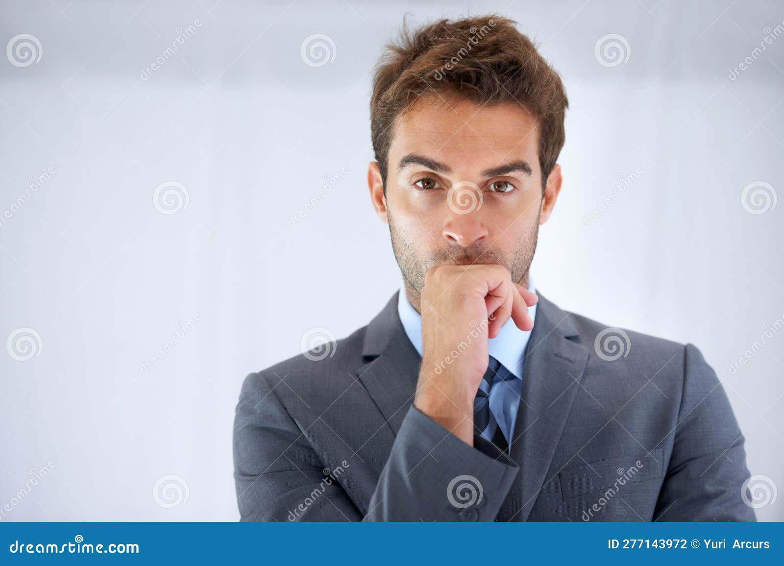 The Modern Professional. a Handsome Young Businessman at Work. Stock ...