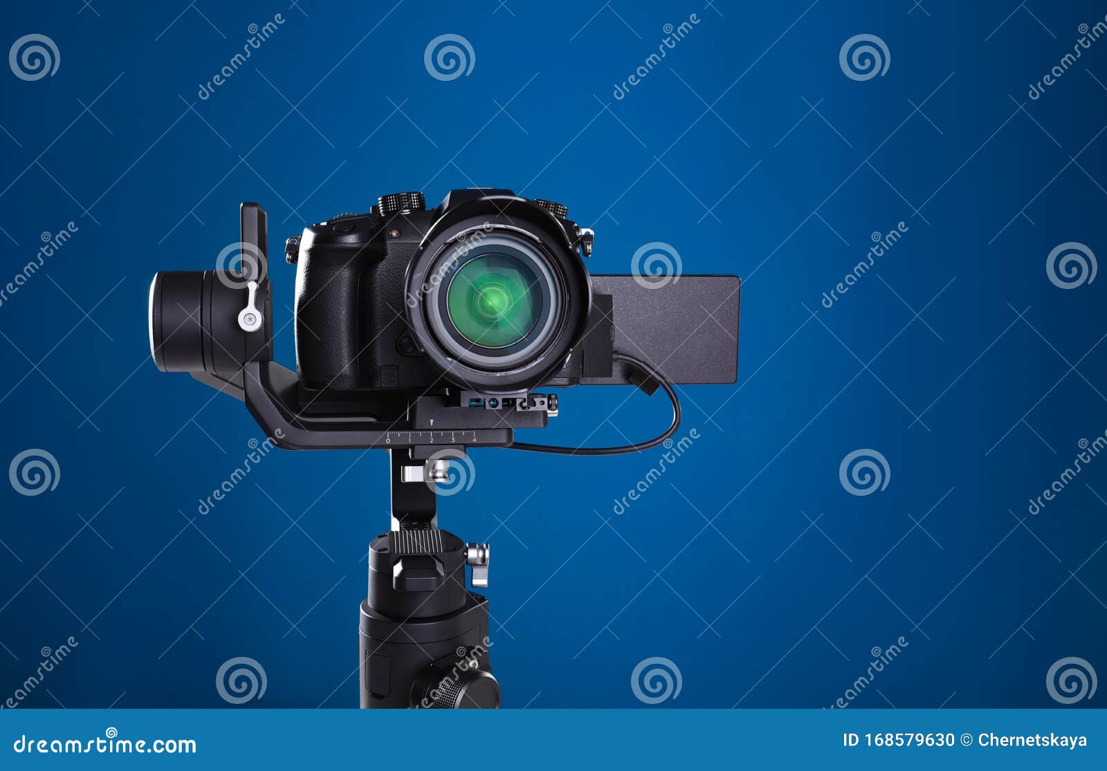 Modern Professional Video Camera on Blue Stock Photo - Image of ...