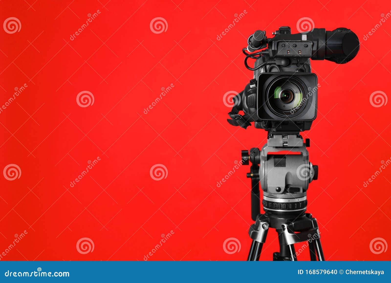 Modern Professional Video Camera on Red. Space for Text Stock Photo ...